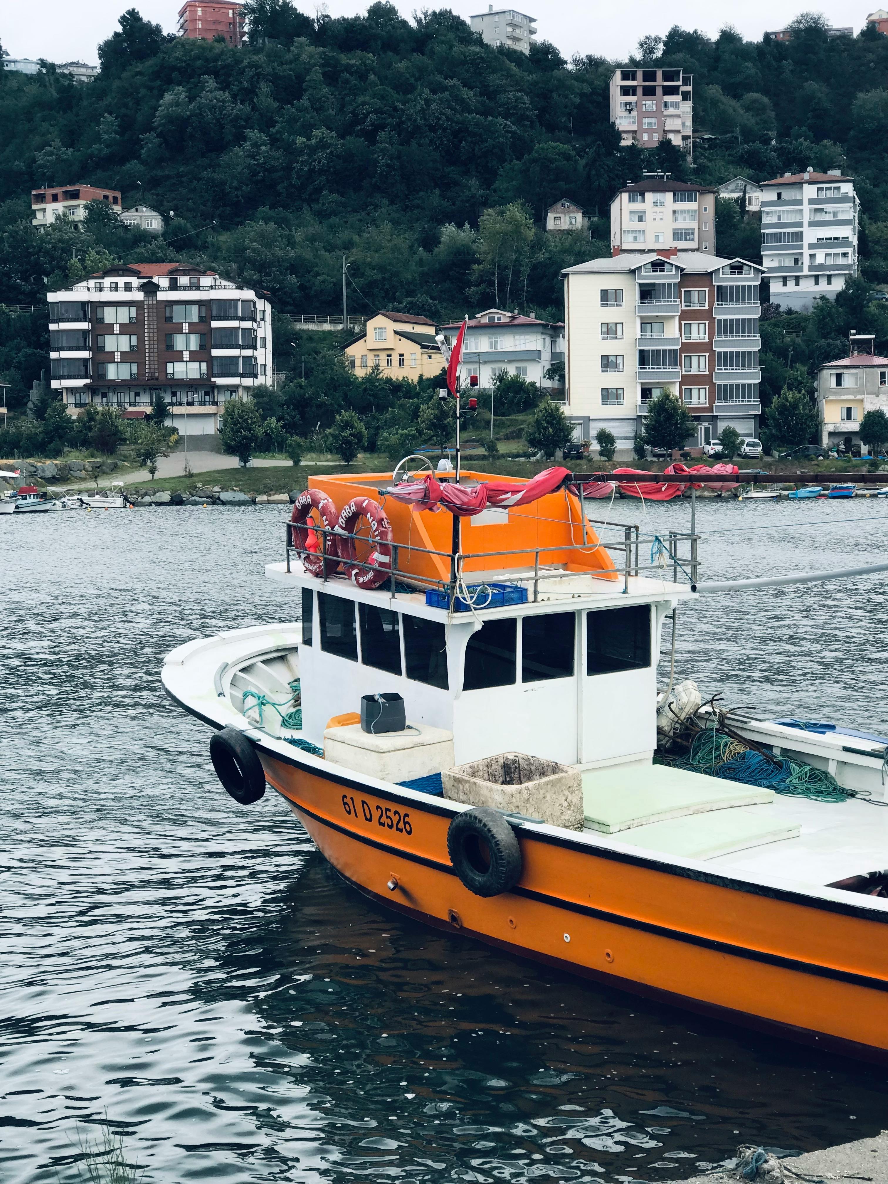 Motorboat Moored in Town · Free Stock Photo