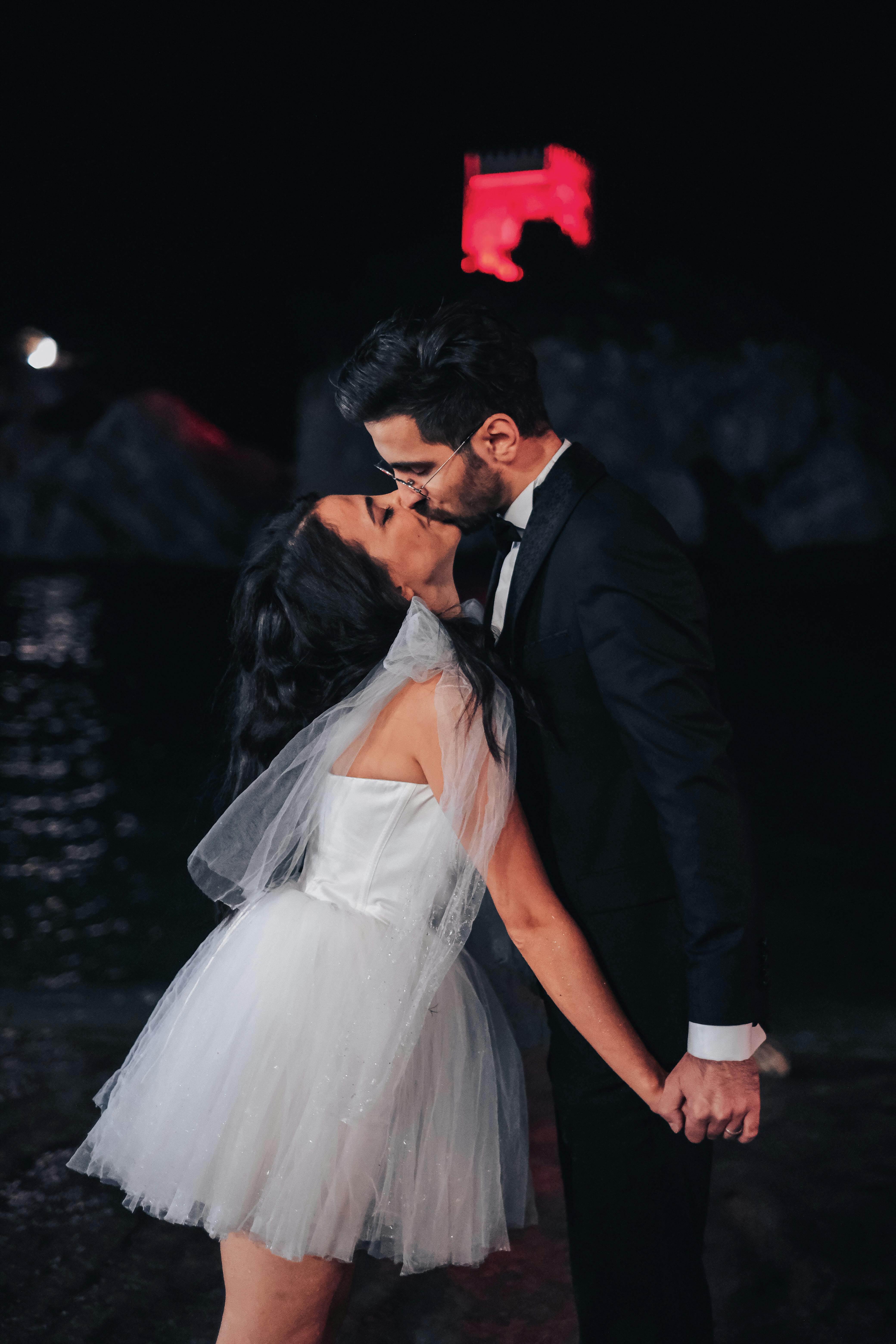 Silhouette of Couple Kissing during Sunset · Free Stock Photo