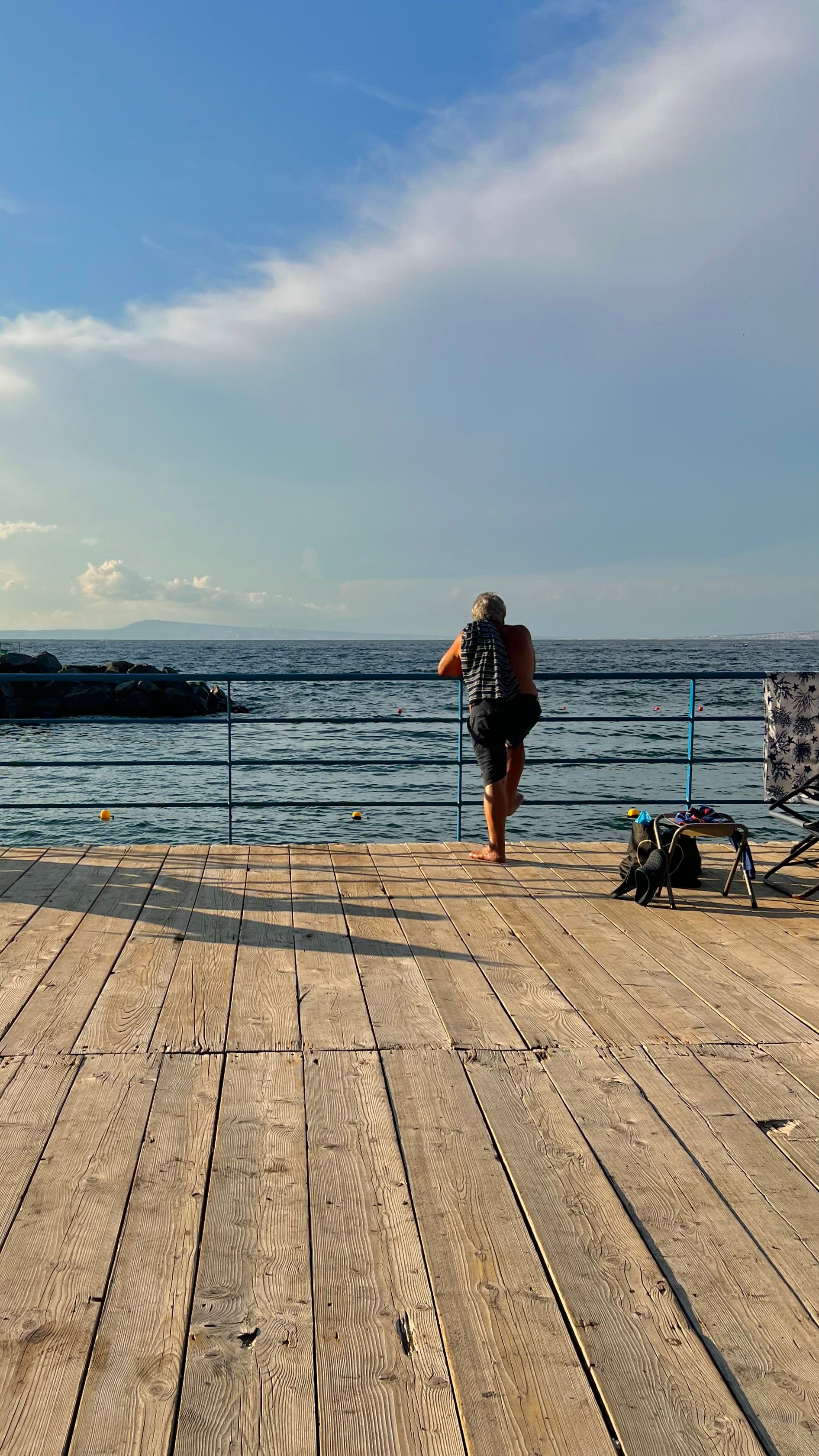 Men Standing on Boardwalk near Sea · Free Stock Photo