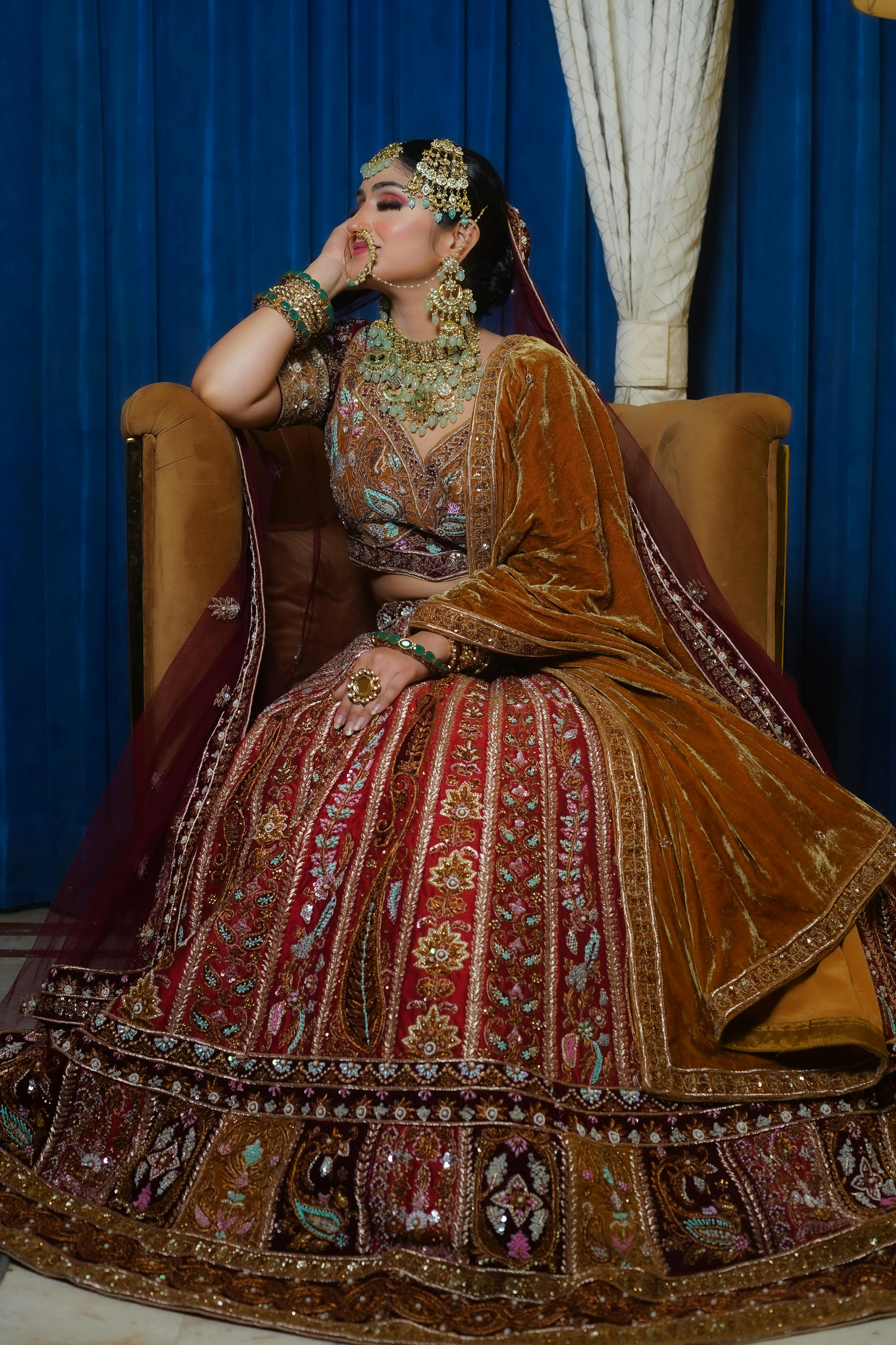 Indian Bride Sitting in Armchair · Free Stock Photo