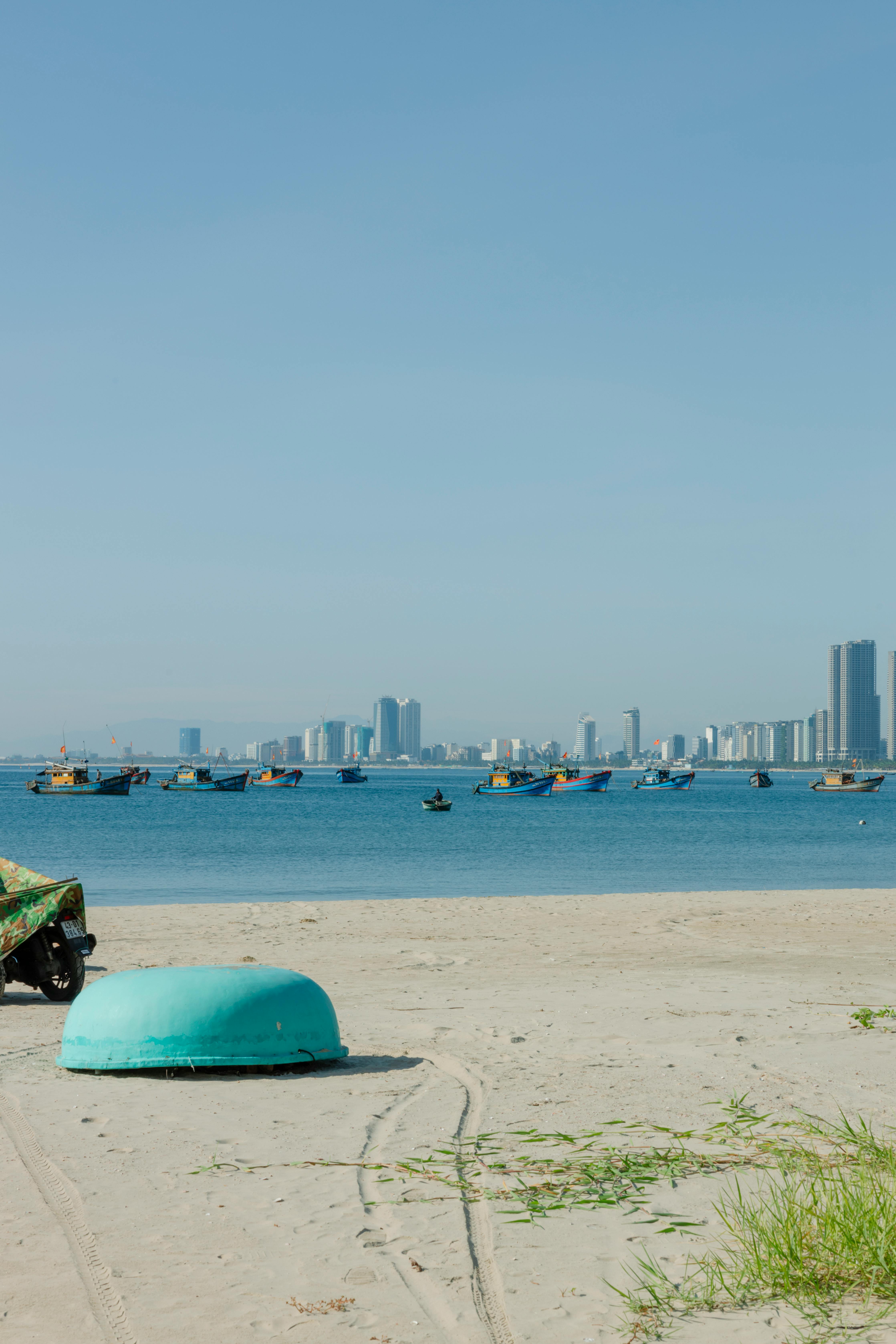 Coastal City Skyline across the Water · Free Stock Photo