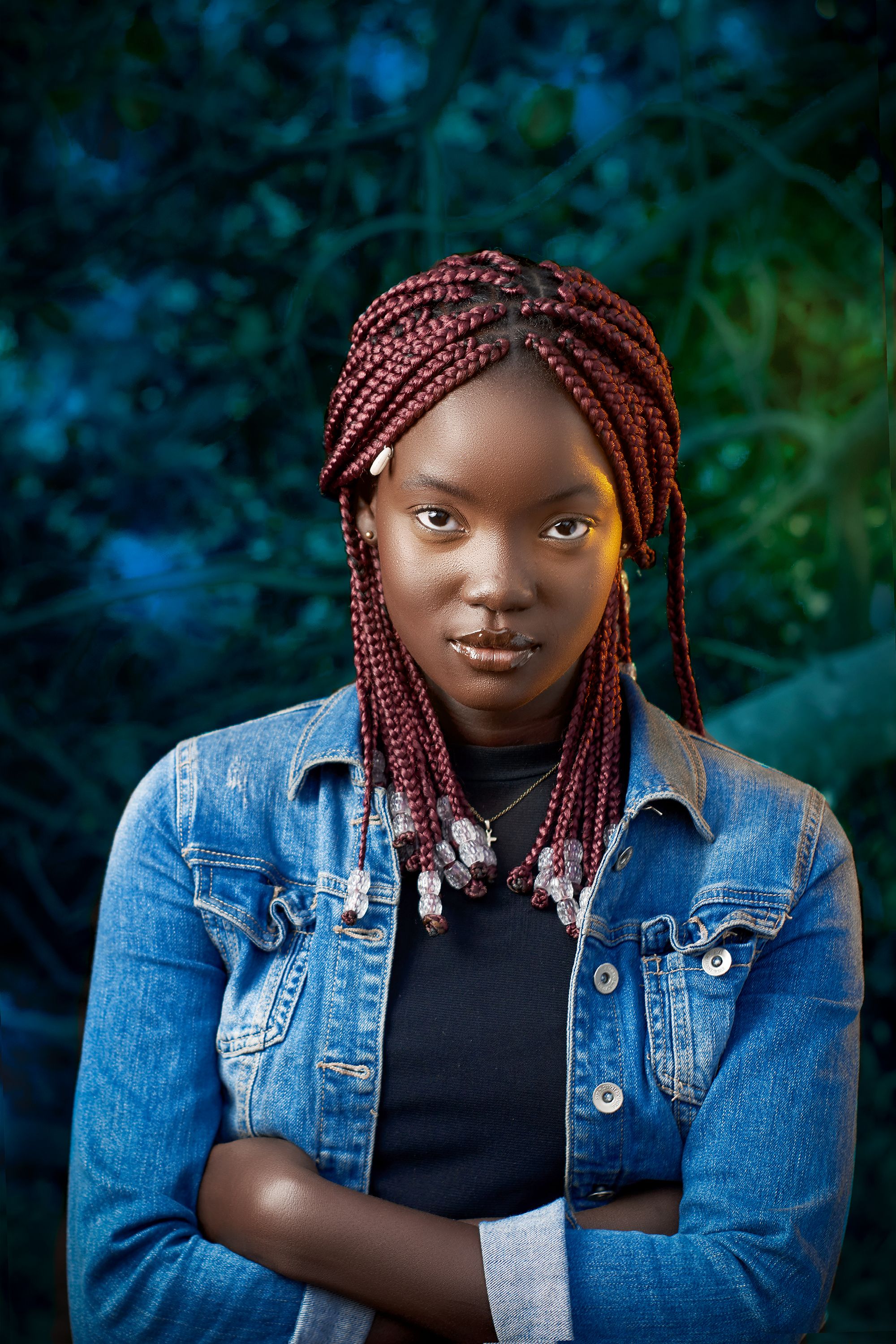 Photograph of a Girl Posing with Her Arms Crossed · Free Stock Photo