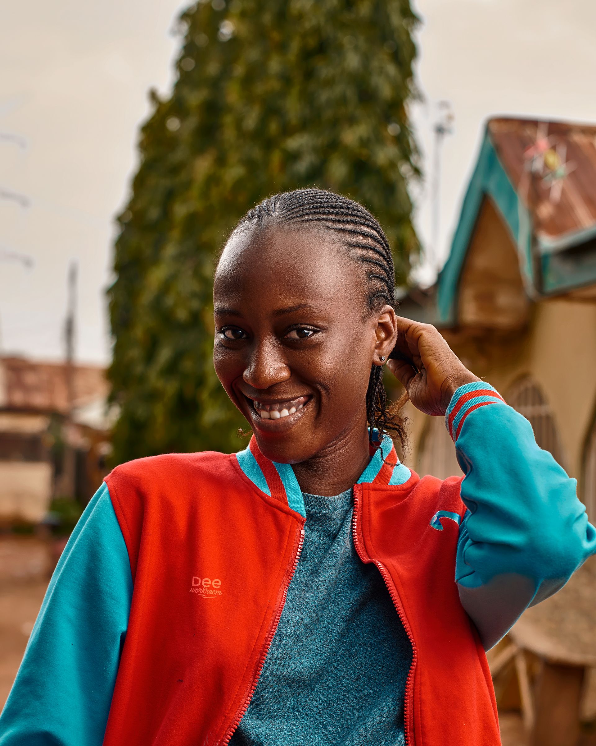 Woman in Blue Jacket Smiling · Free Stock Photo