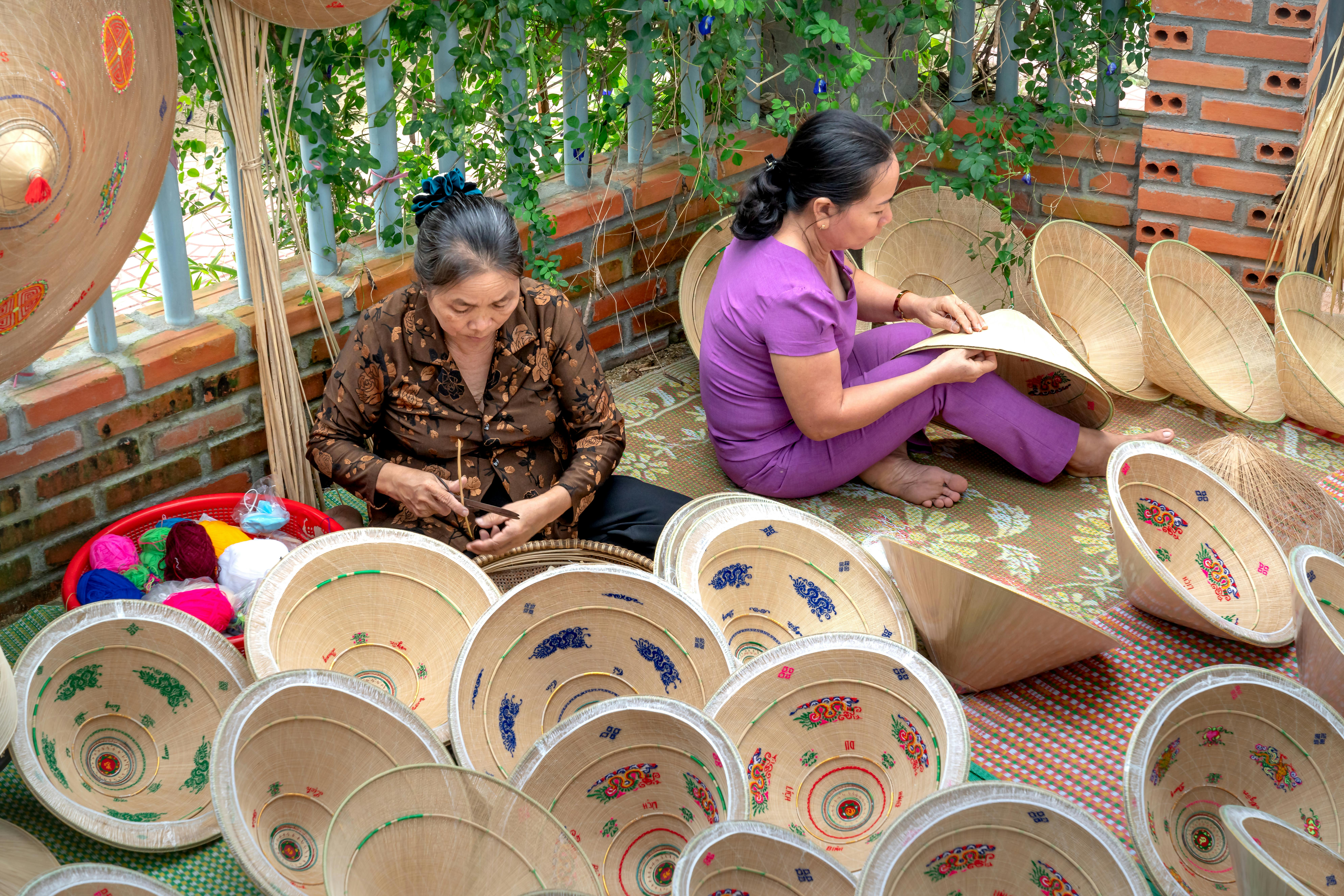 Women Making Conical Hats · Free Stock Photo