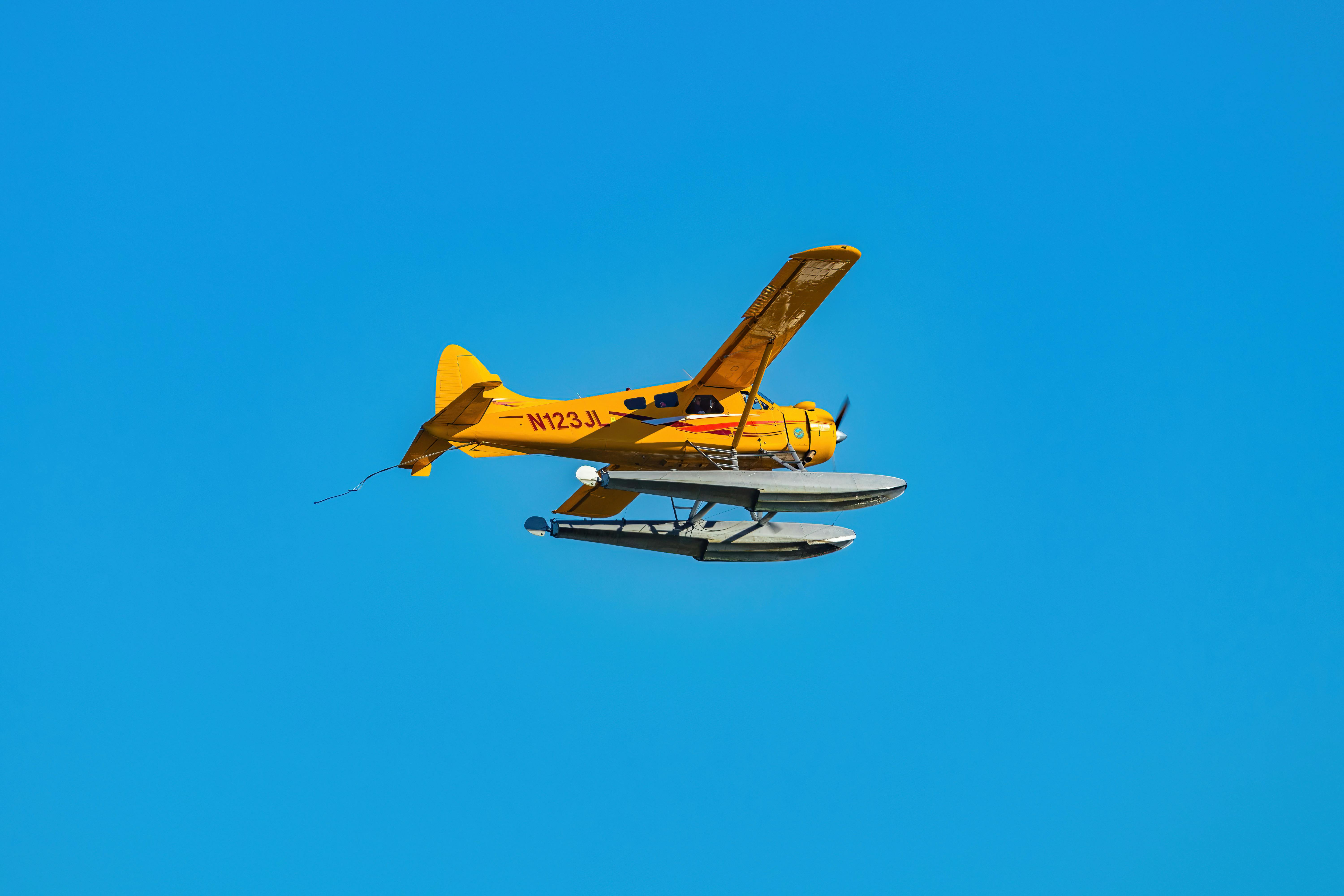 A Seaplane Across the Blue Sky · Free Stock Photo