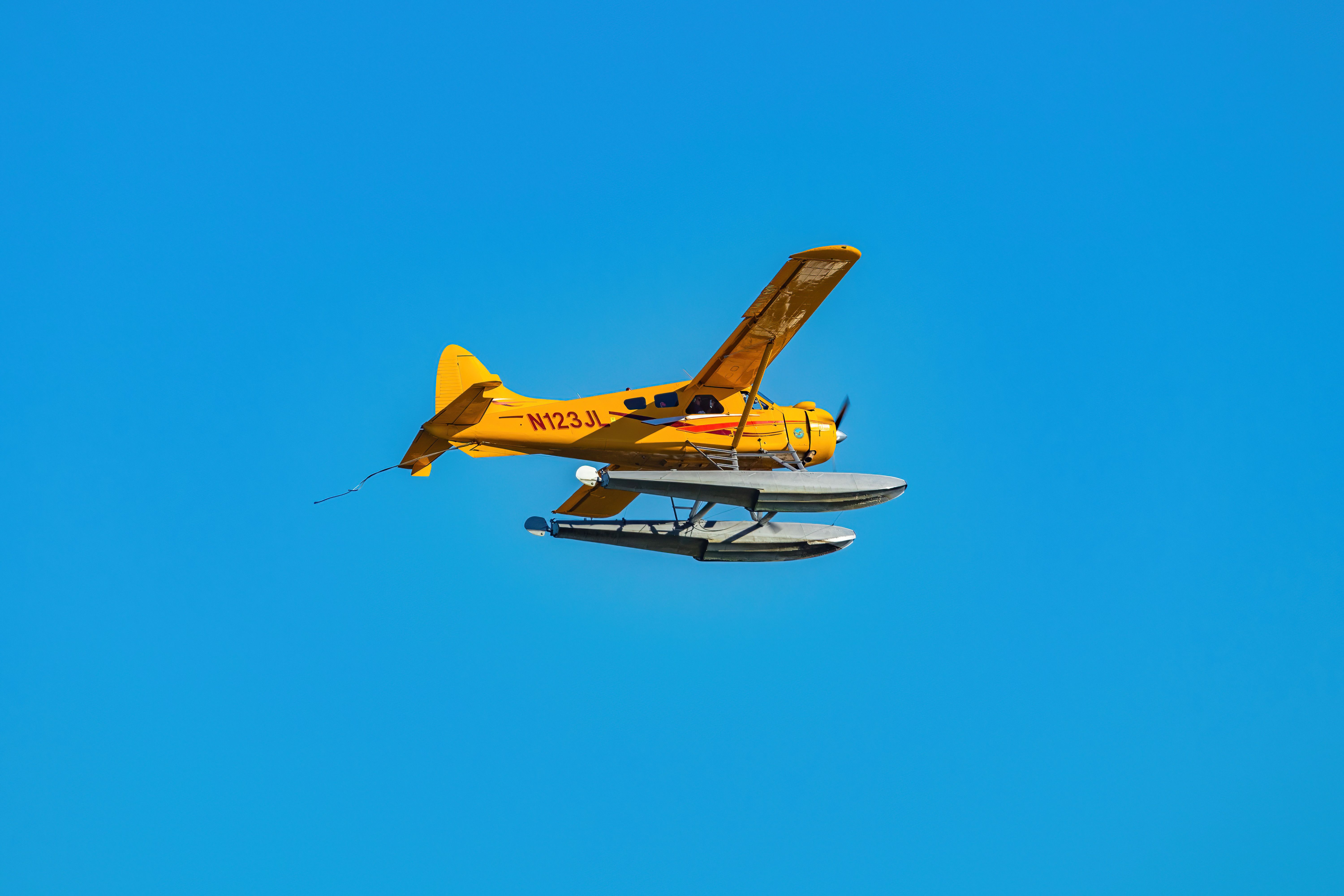 Seaplane Flying Low Above Water · Free Stock Photo