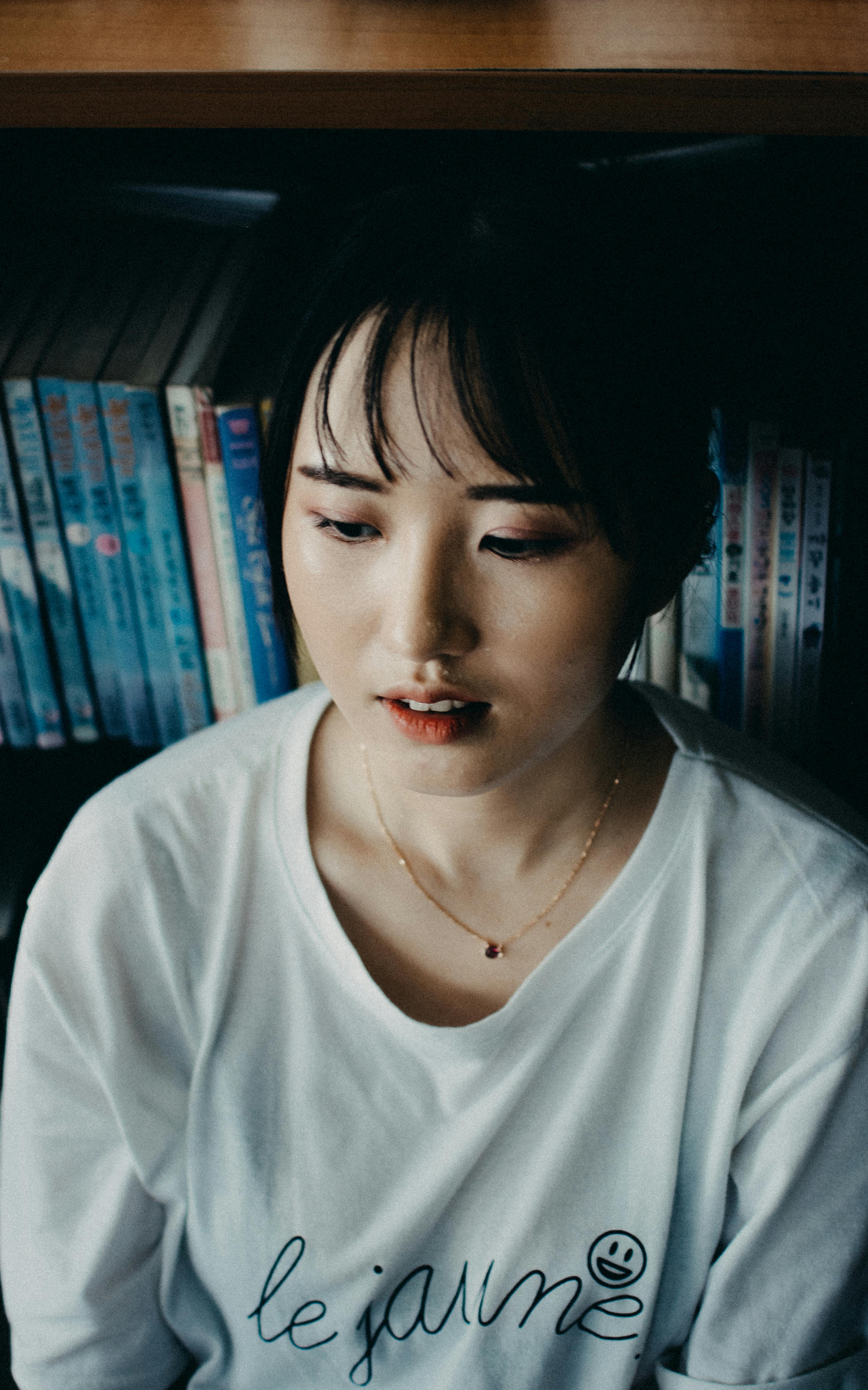 Girl Holding a Basket of Yams · Free Stock Photo