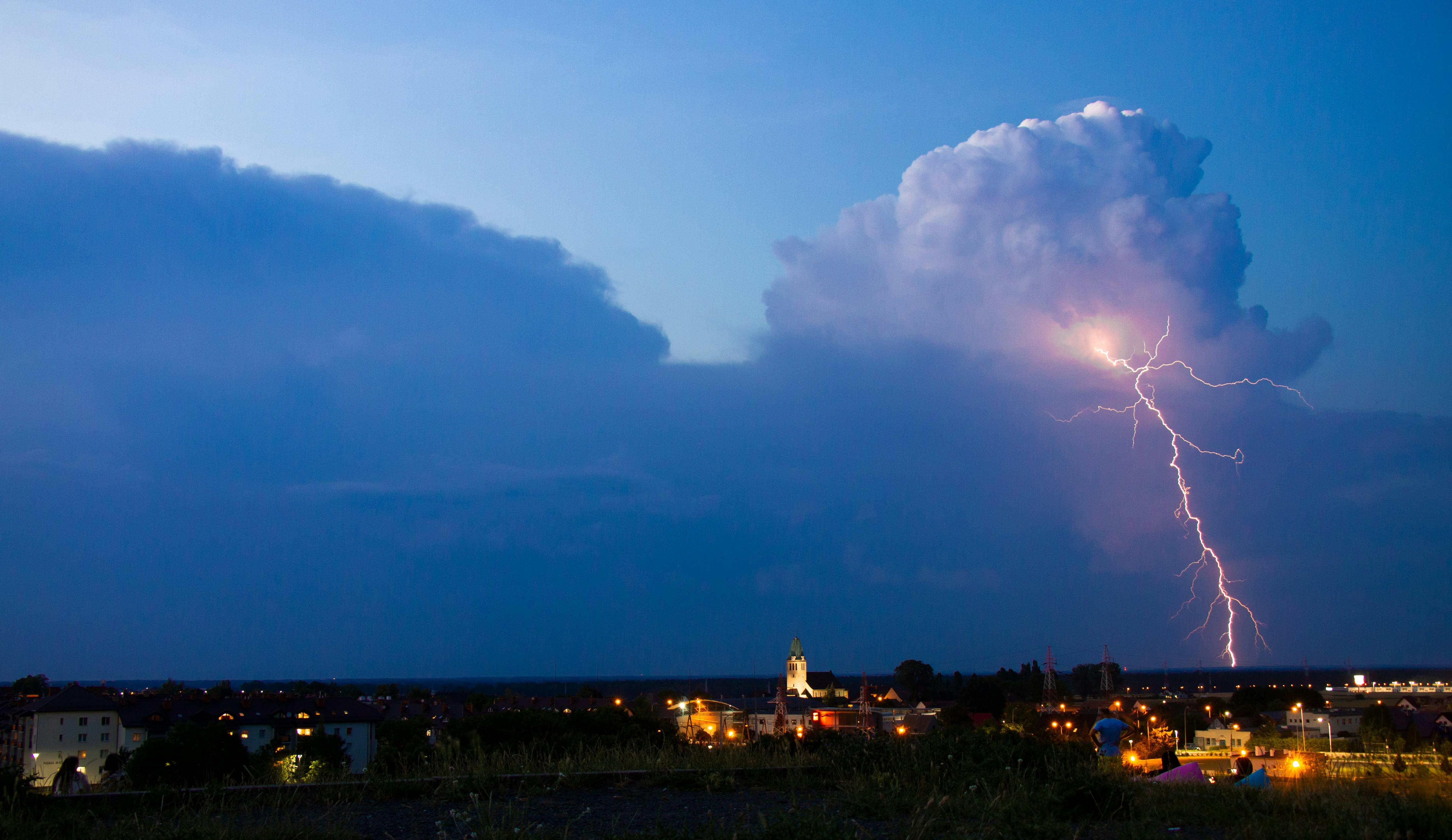 Lightning on White Clouds over City during Night Time · Free Stock Photo