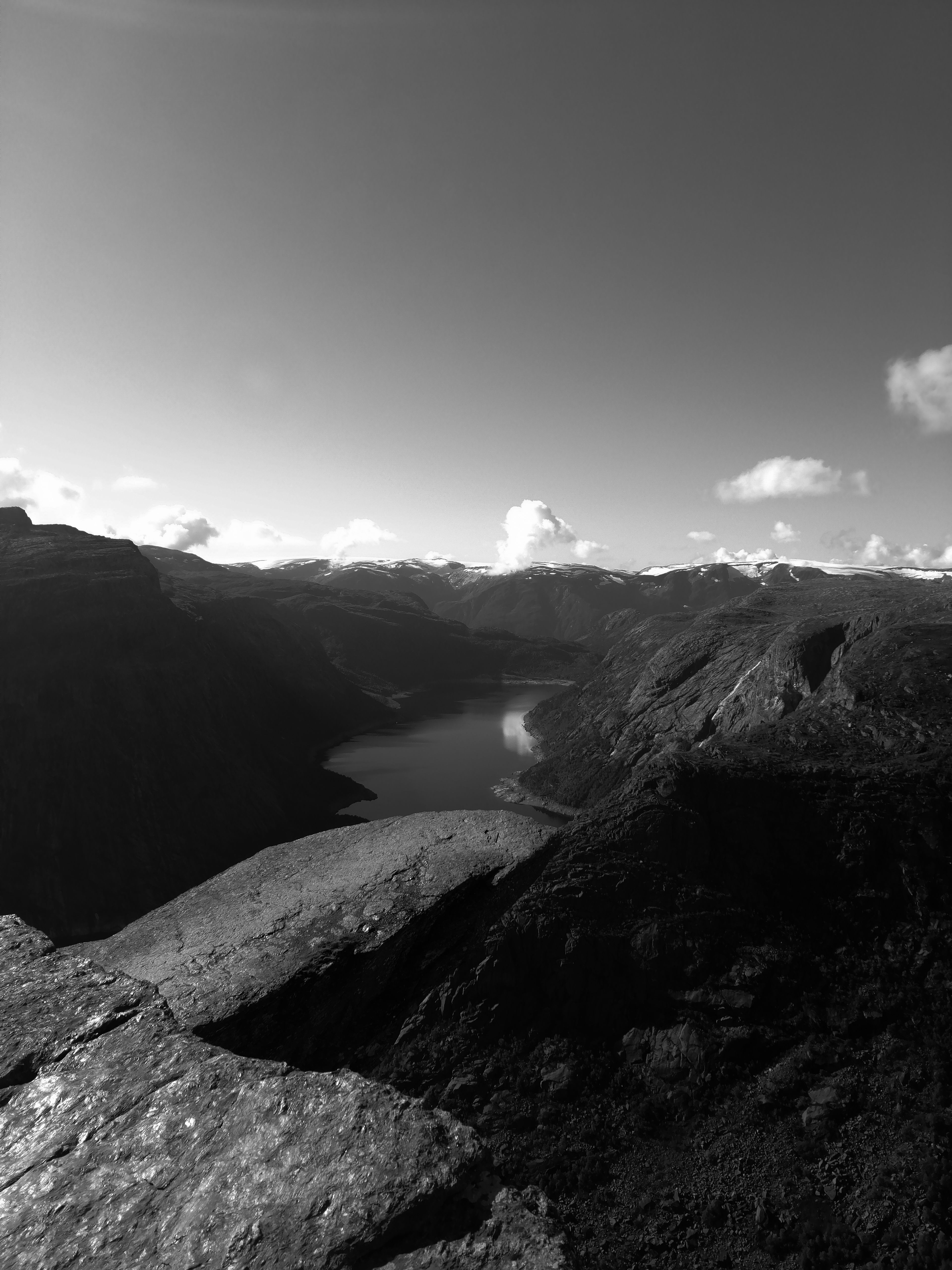 Grayscale Photo of Mountains and River · Free Stock Photo