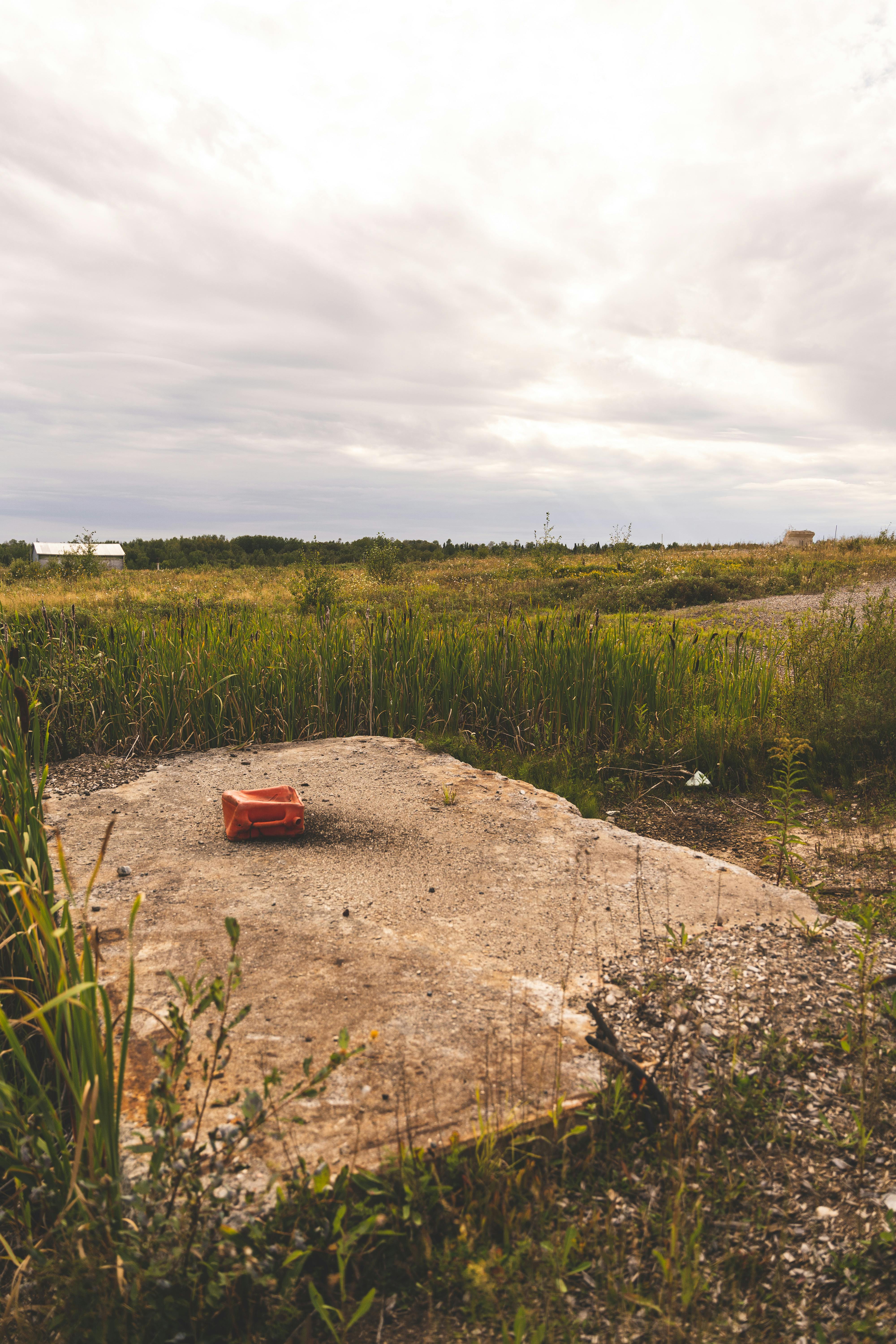 Concrete Platform on Grass Field · Free Stock Photo