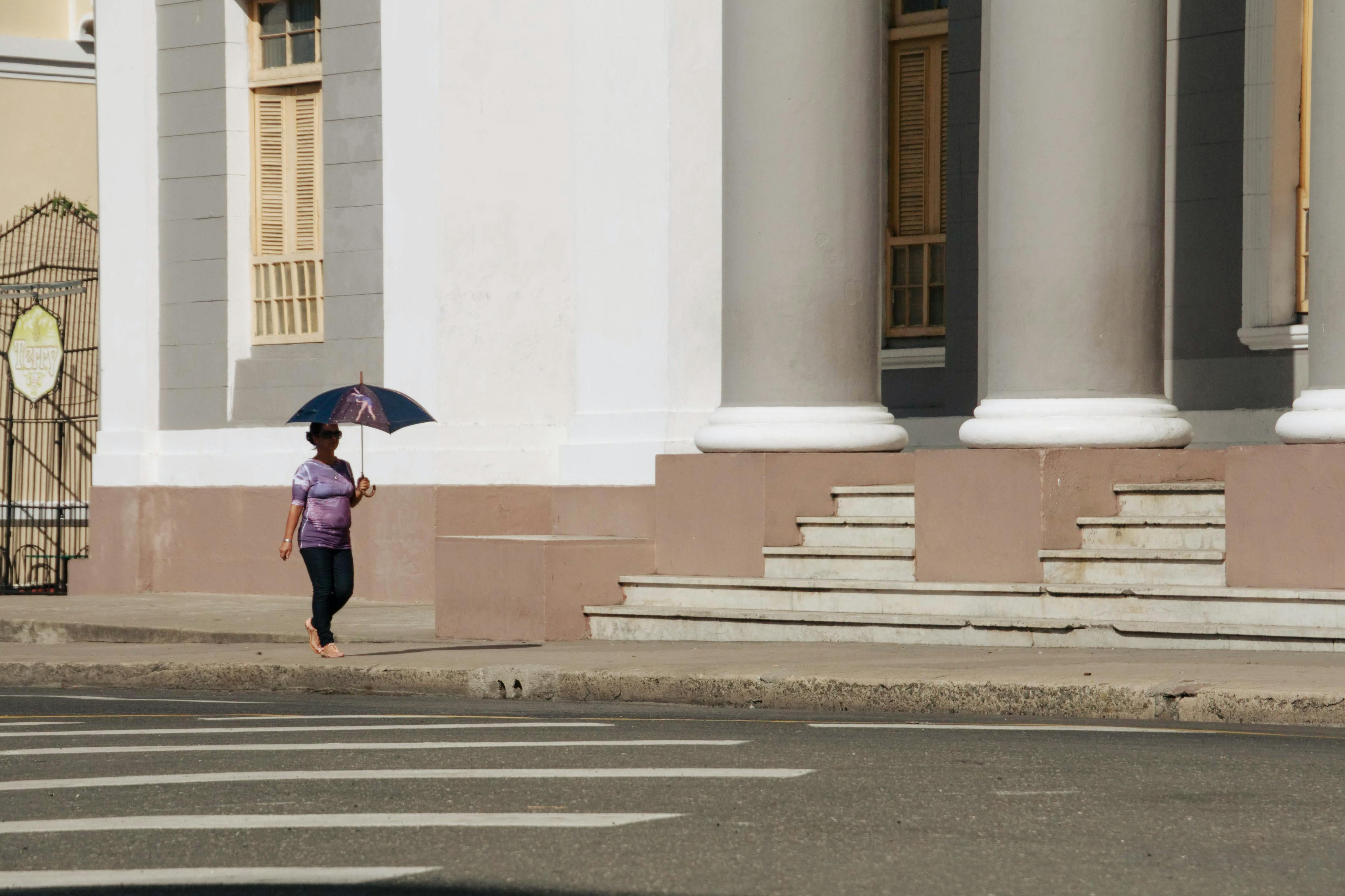 A People Walking on the Sidewalk · Free Stock Photo