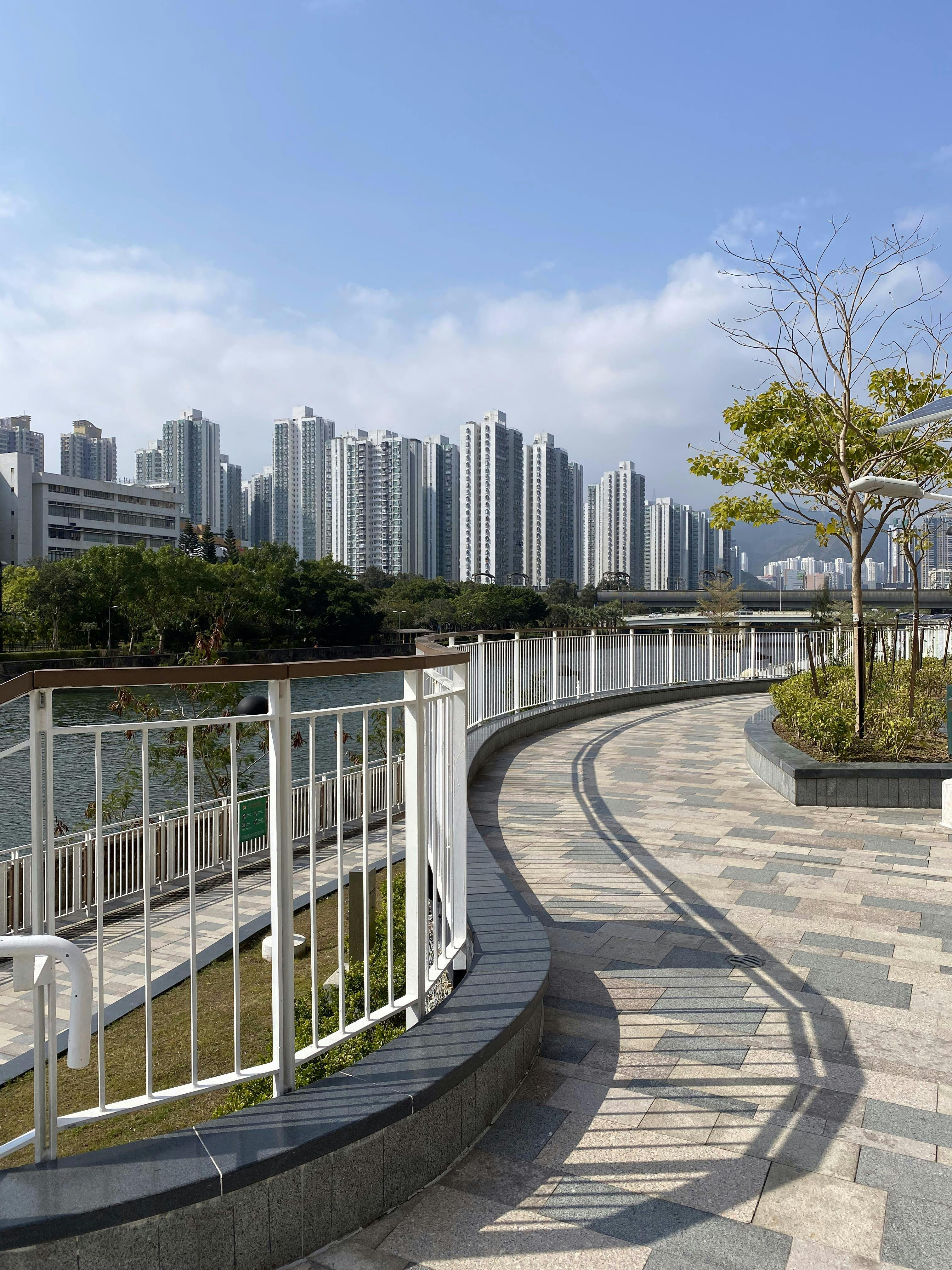 Wooden Boardwalk and Docking Area Overlooking a City at Night · Free ...