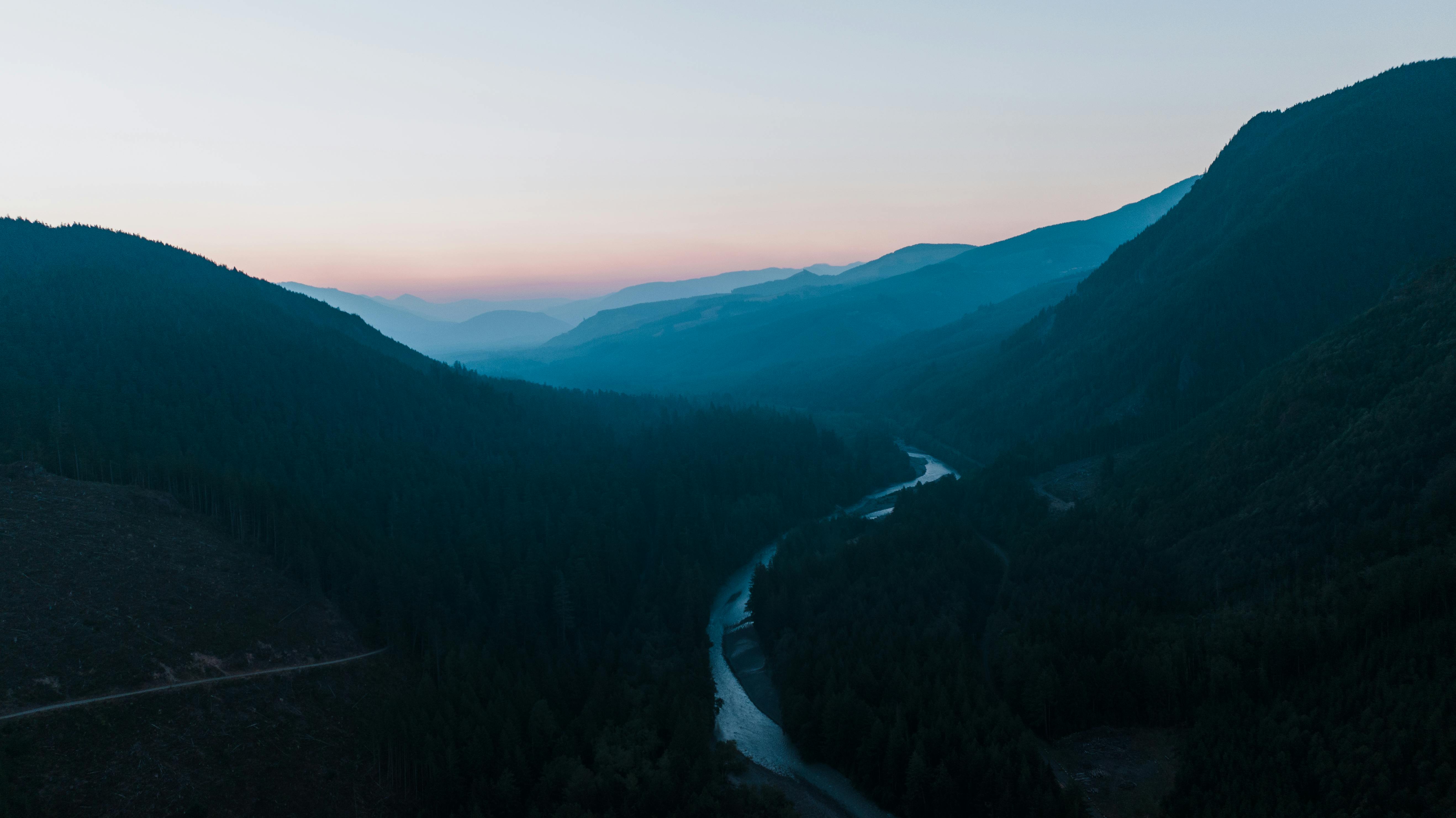 Aerial View of River in Between Mountains · Free Stock Photo