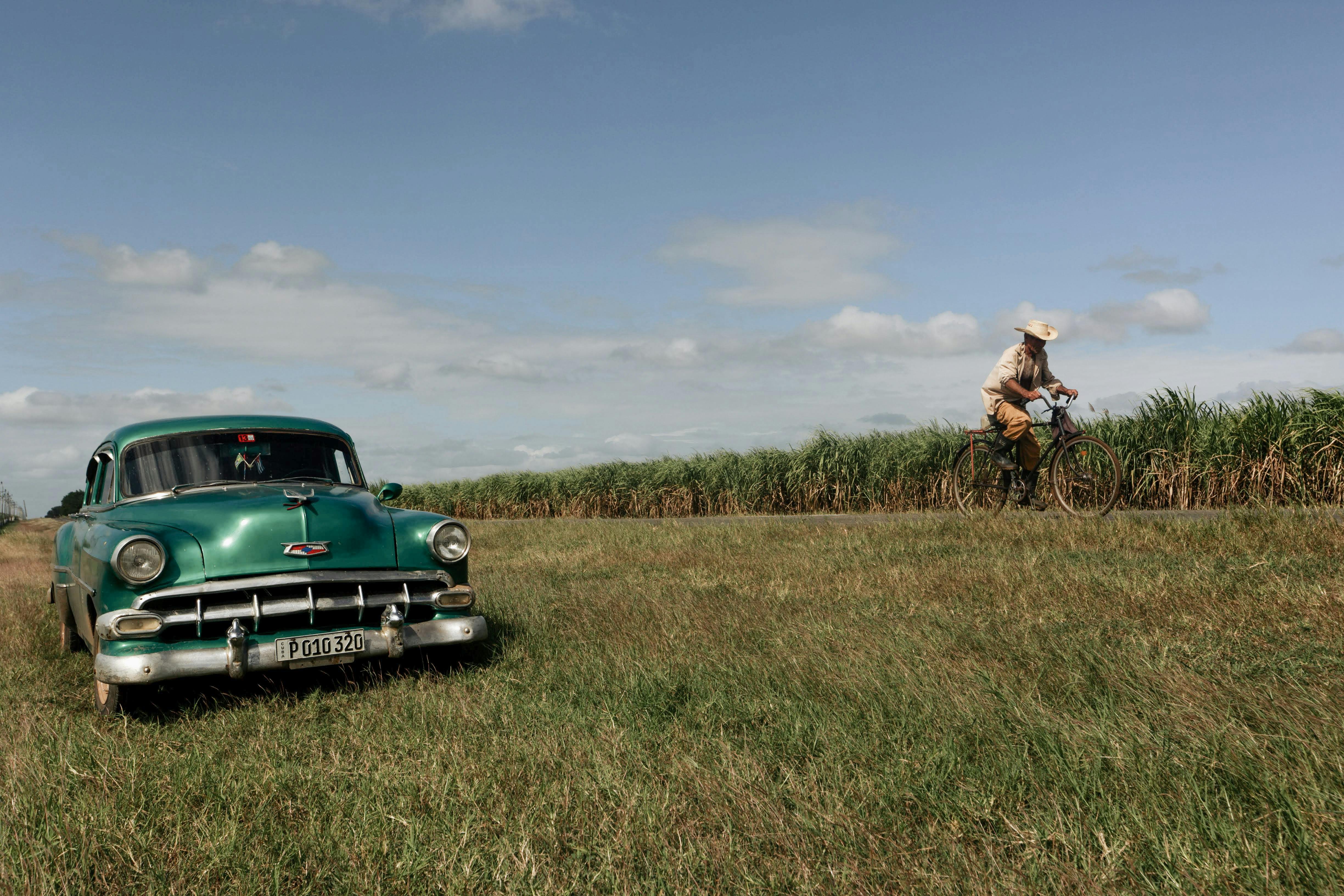 Vintage Green Car on Grass · Free Stock Photo