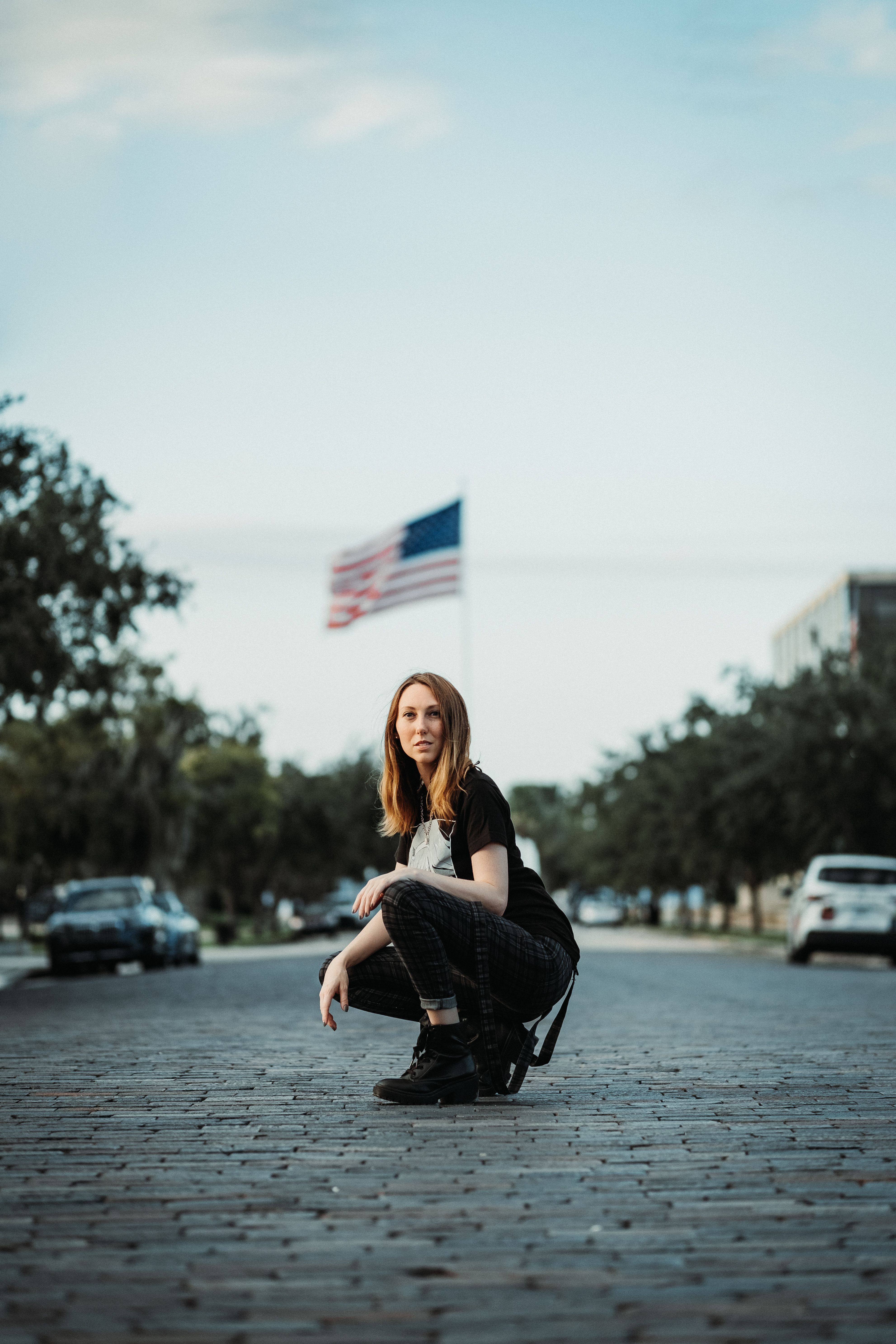 Woman Posing with American Flag in Background · Free Stock Photo
