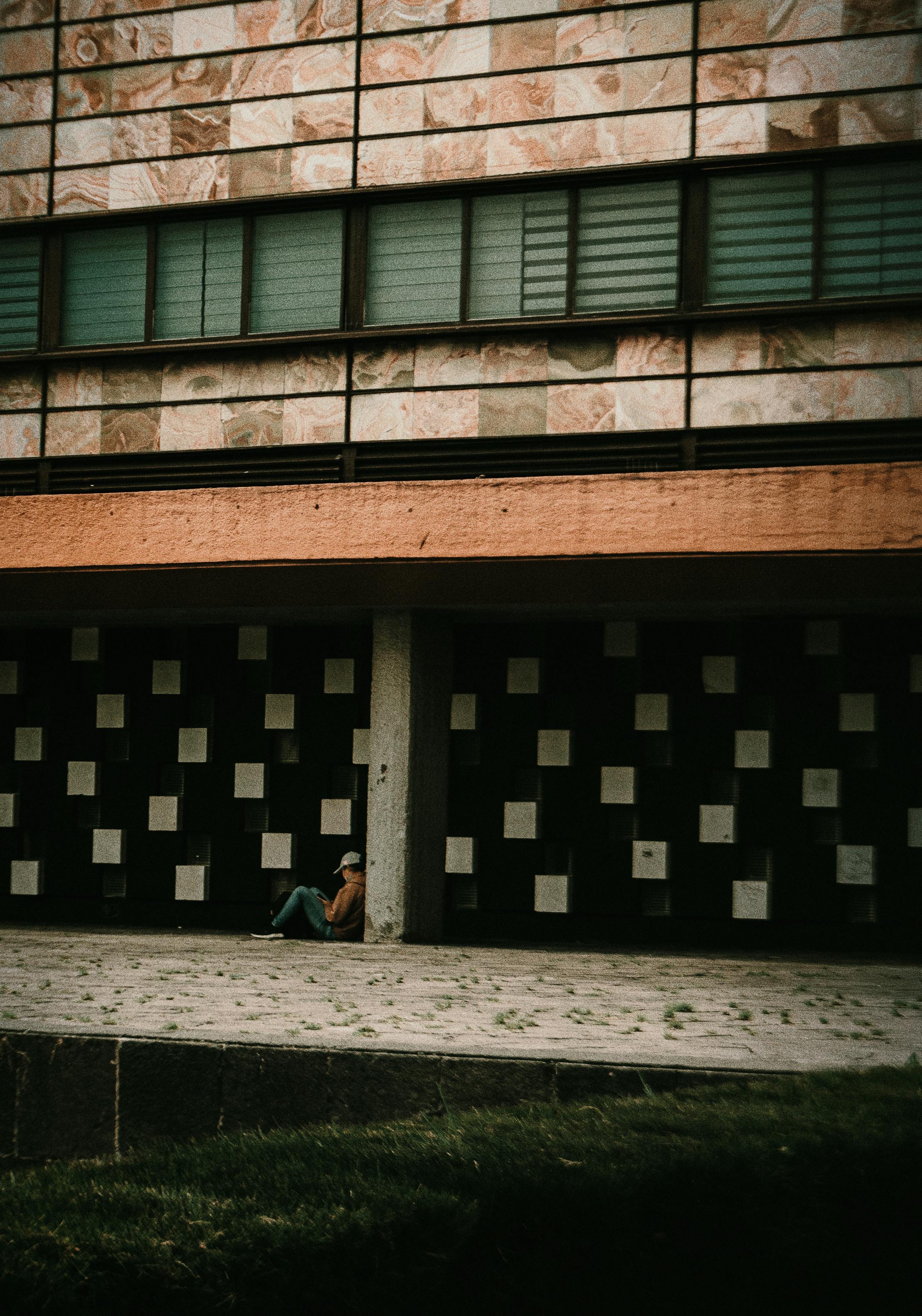 Man Hiding Behind A Concrete Wall · Free Stock Photo