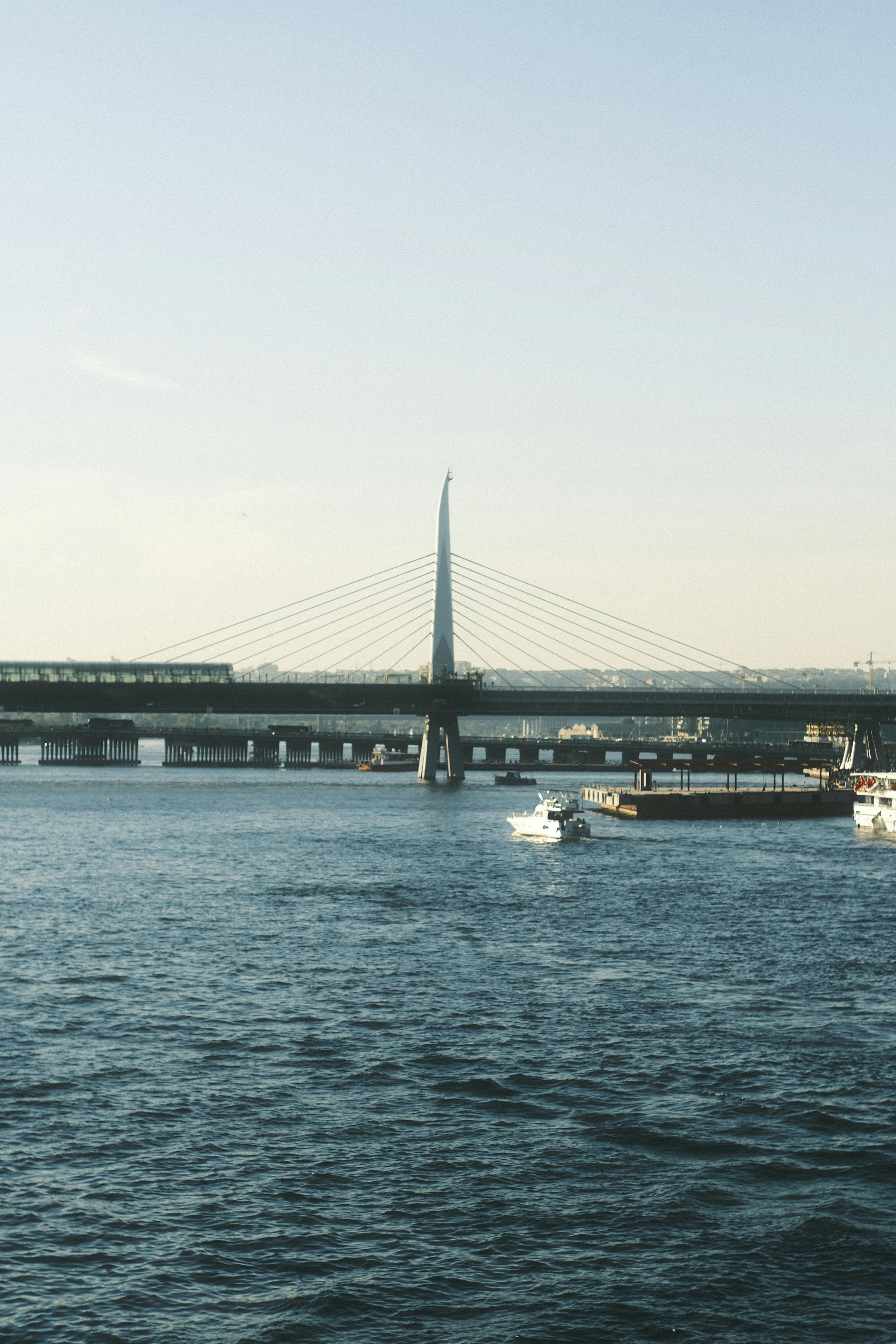 A Boat Sailing Near Gold Horn Bridge · Free Stock Photo
