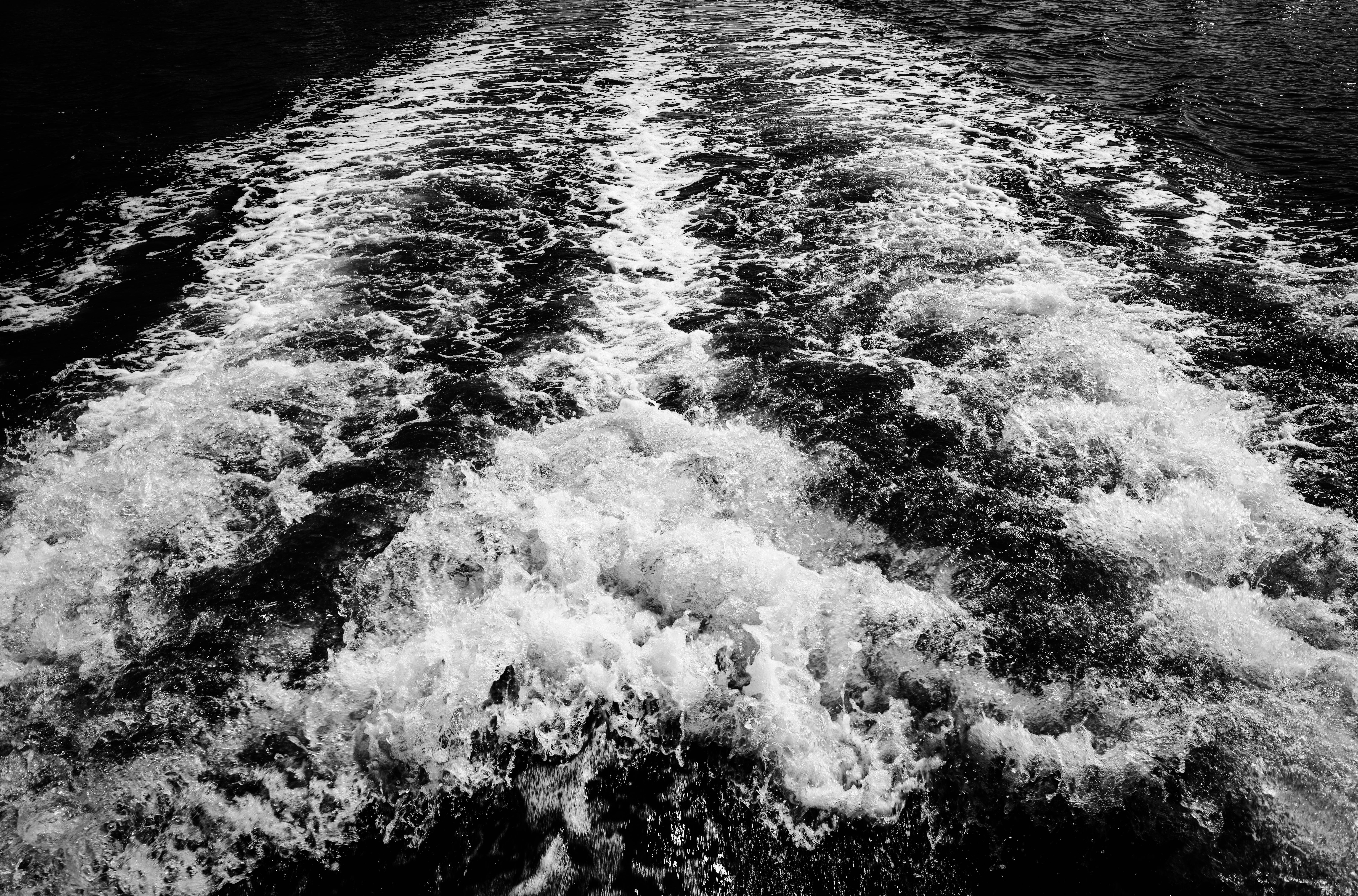 Grayscale Photography of Water Waves · Free Stock Photo