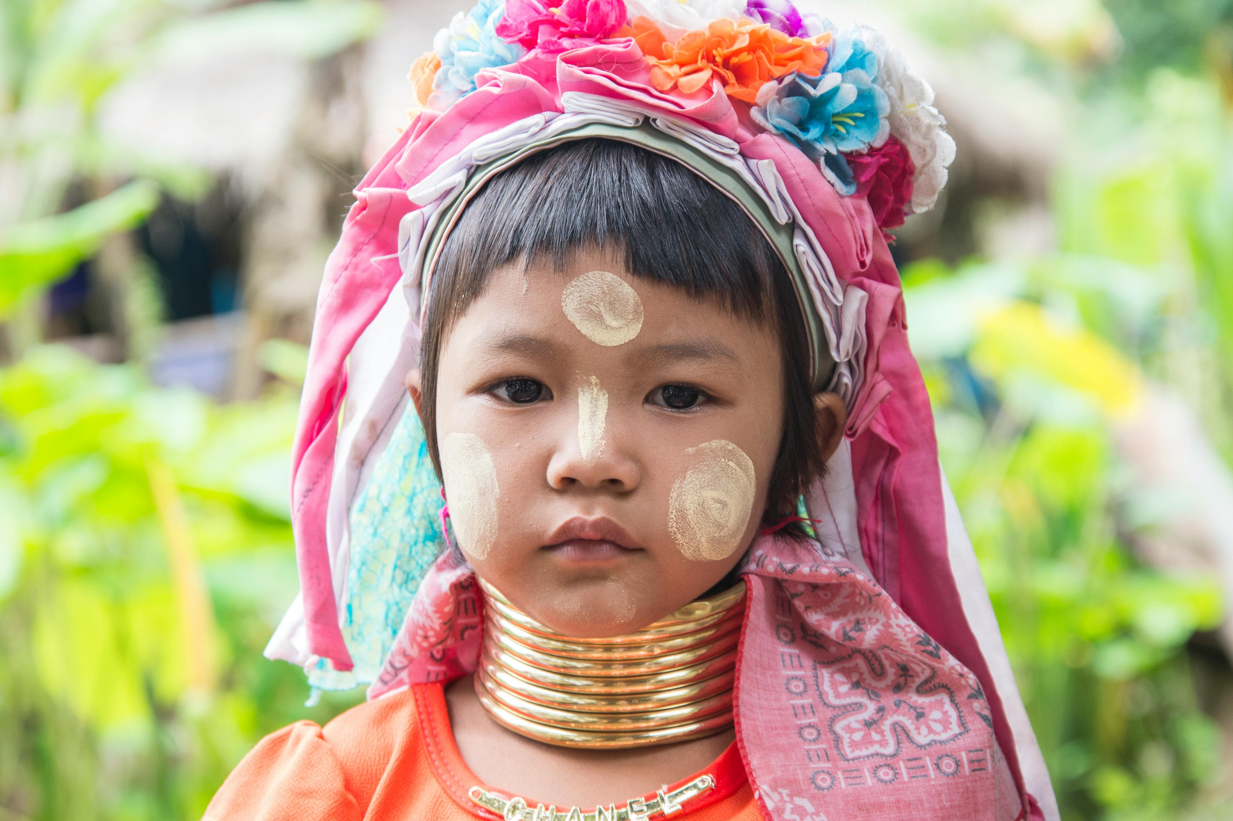 Little Girl in Traditional Outfit and Face Paint · Free Stock Photo