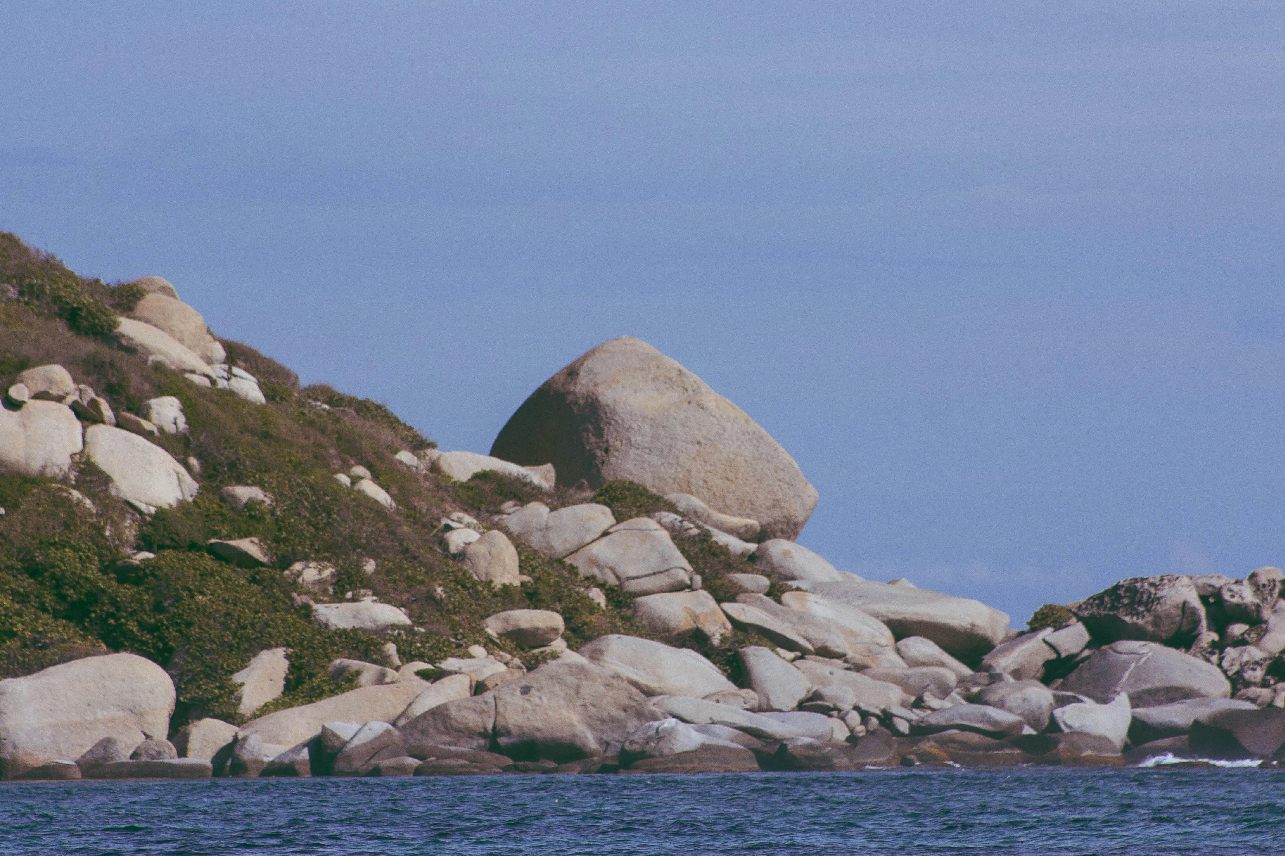 Smooth Rocks on Sea Shore · Free Stock Photo