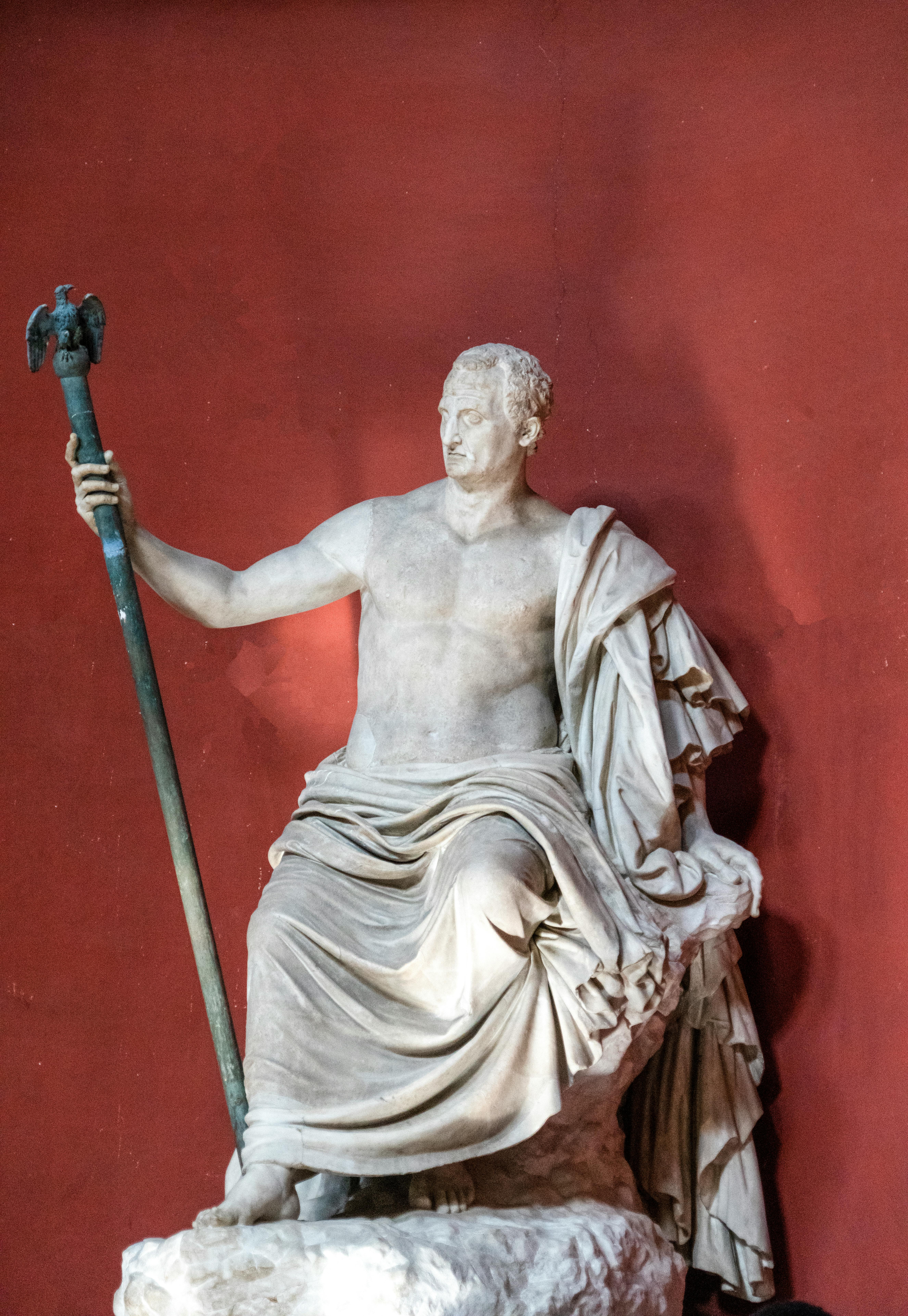 Marble Roman Sculpture on Red Back · Free Stock Photo