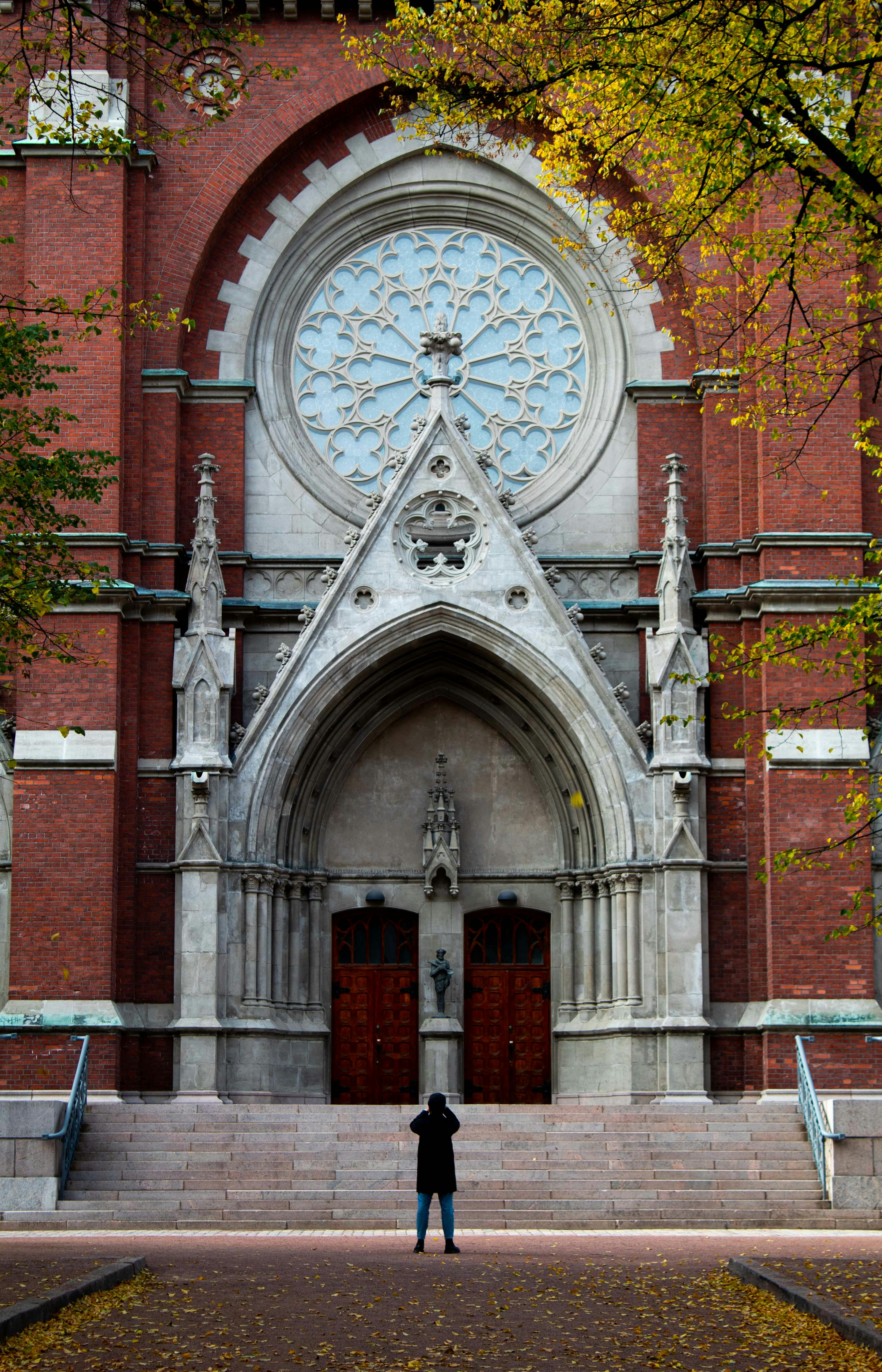 Man Standing in front of Saint John Church in Helsinki, Finland · Free ...