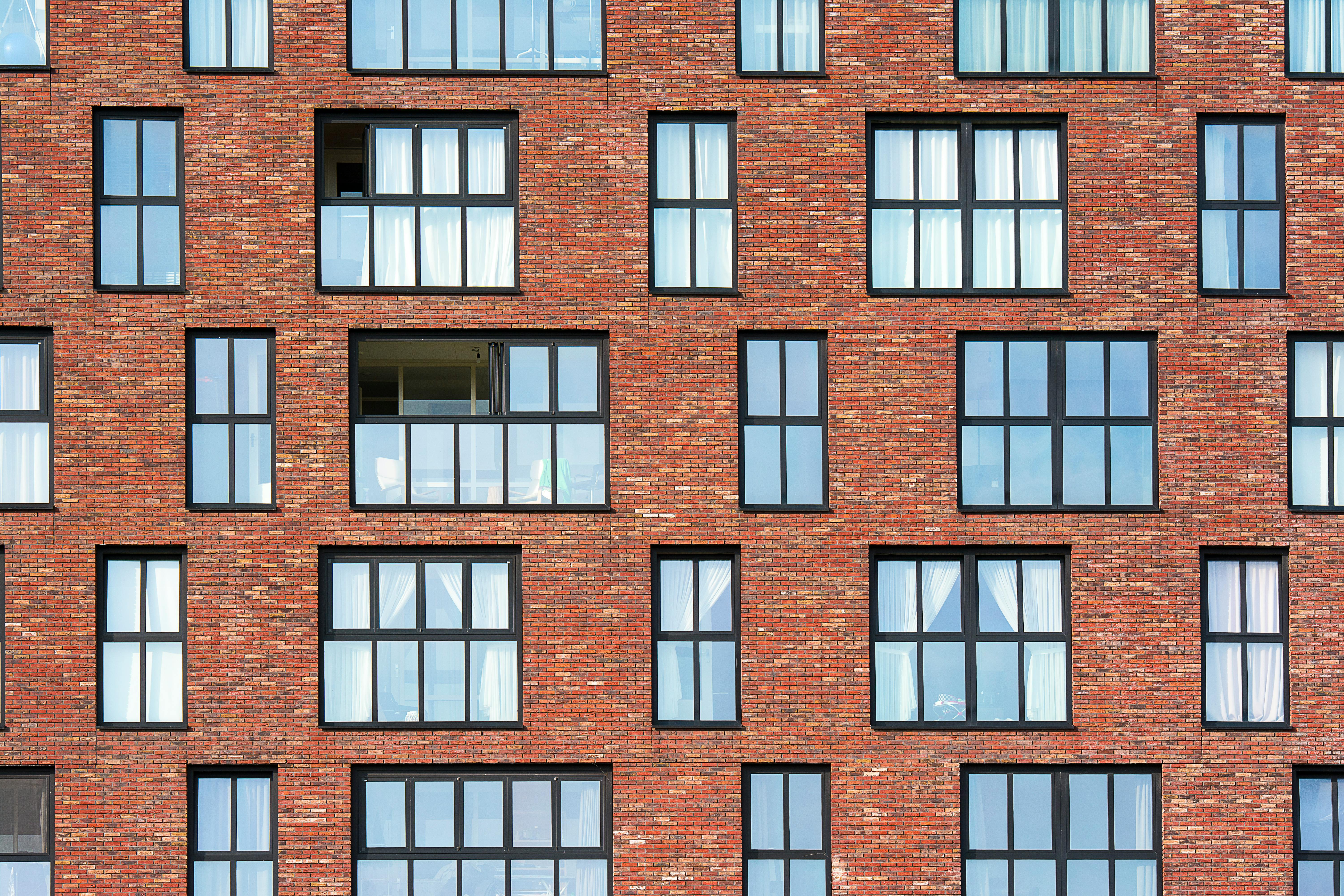 Brick Building with Glass Windows · Free Stock Photo