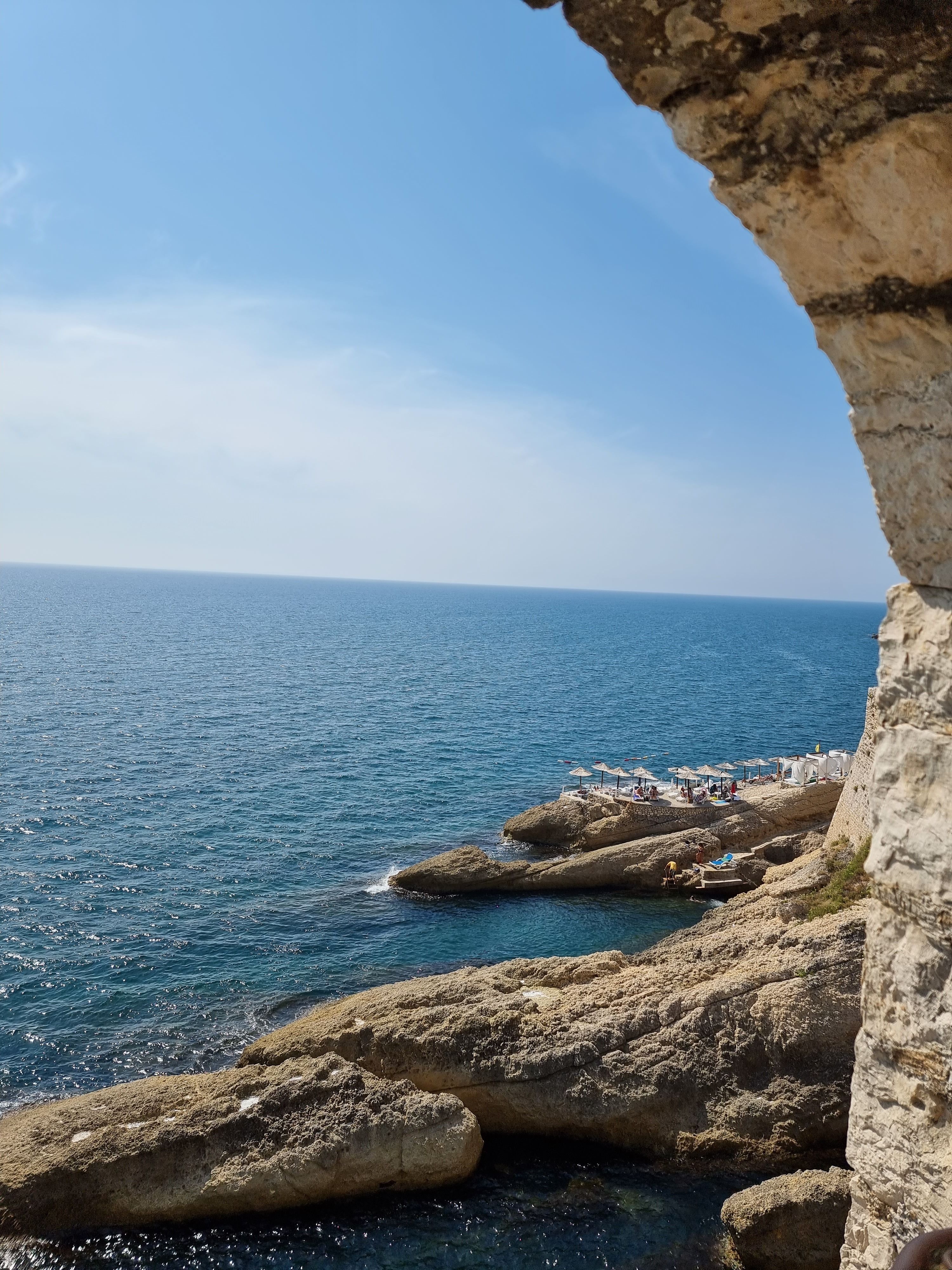 Marble Caves on Body of Water · Free Stock Photo