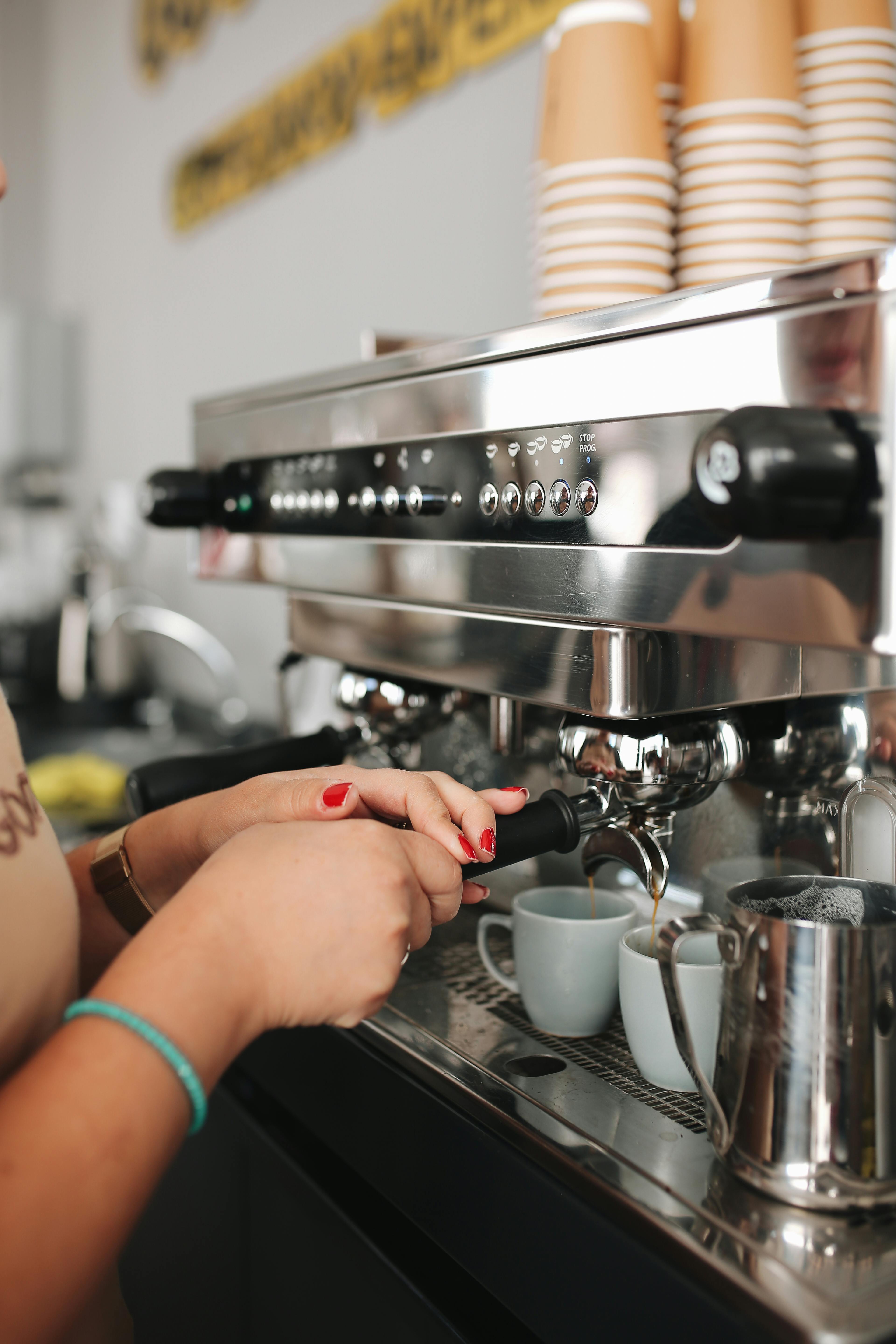 Woman Making Coffee in Cafe · Free Stock Photo
