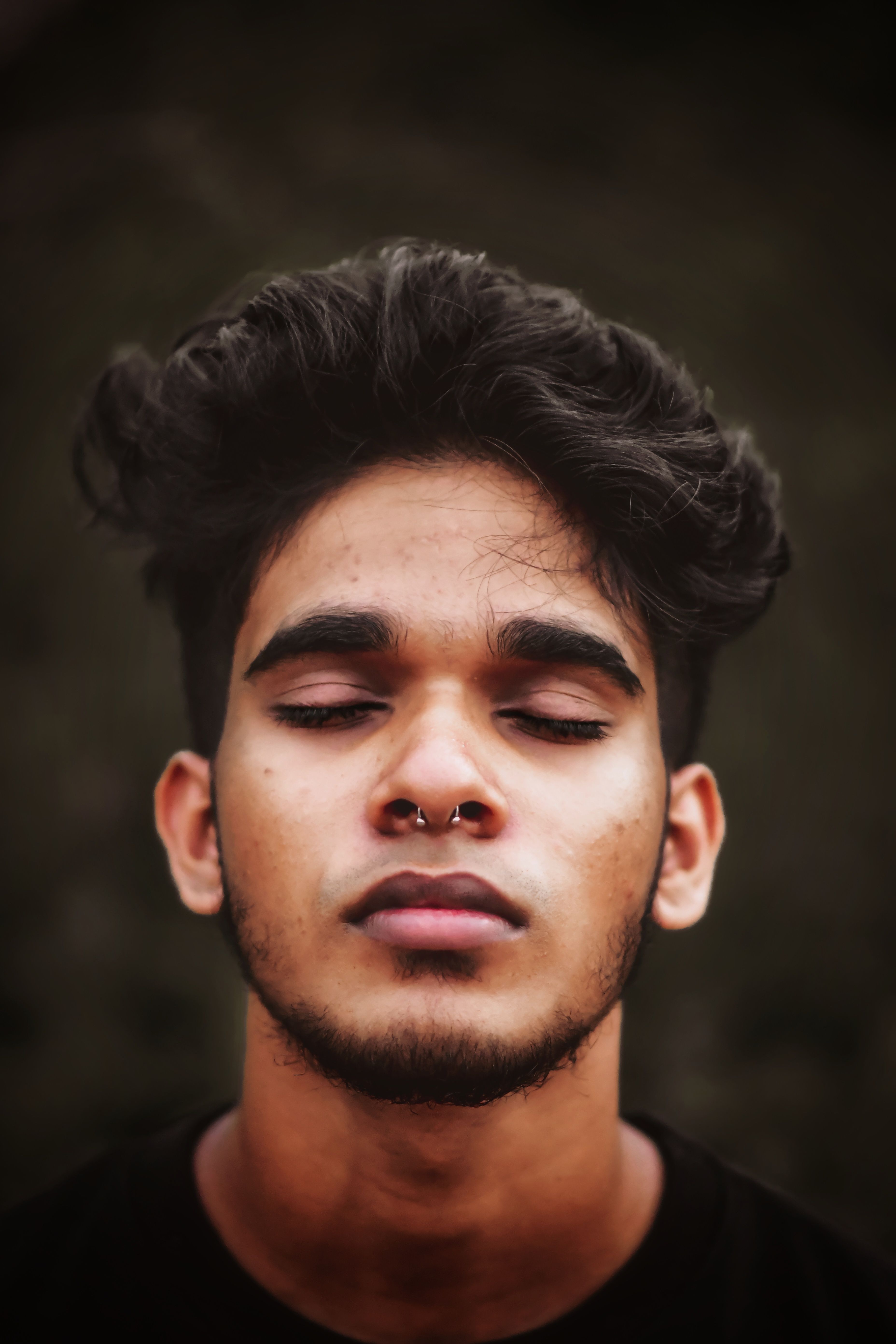 Portrait of a Man with a Nose Piercing · Free Stock Photo