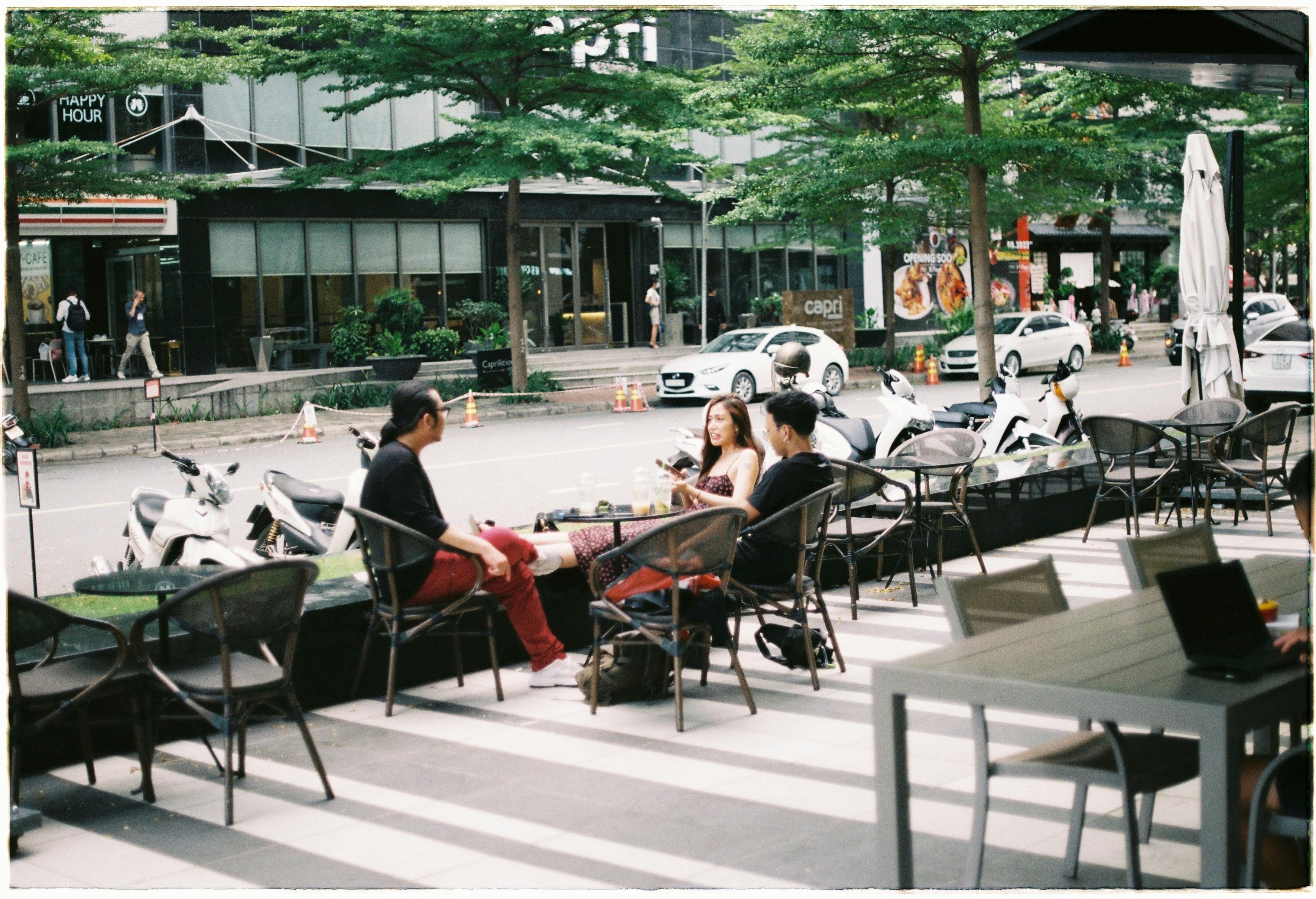 Two Friends Talking Inside the Cafe · Free Stock Photo