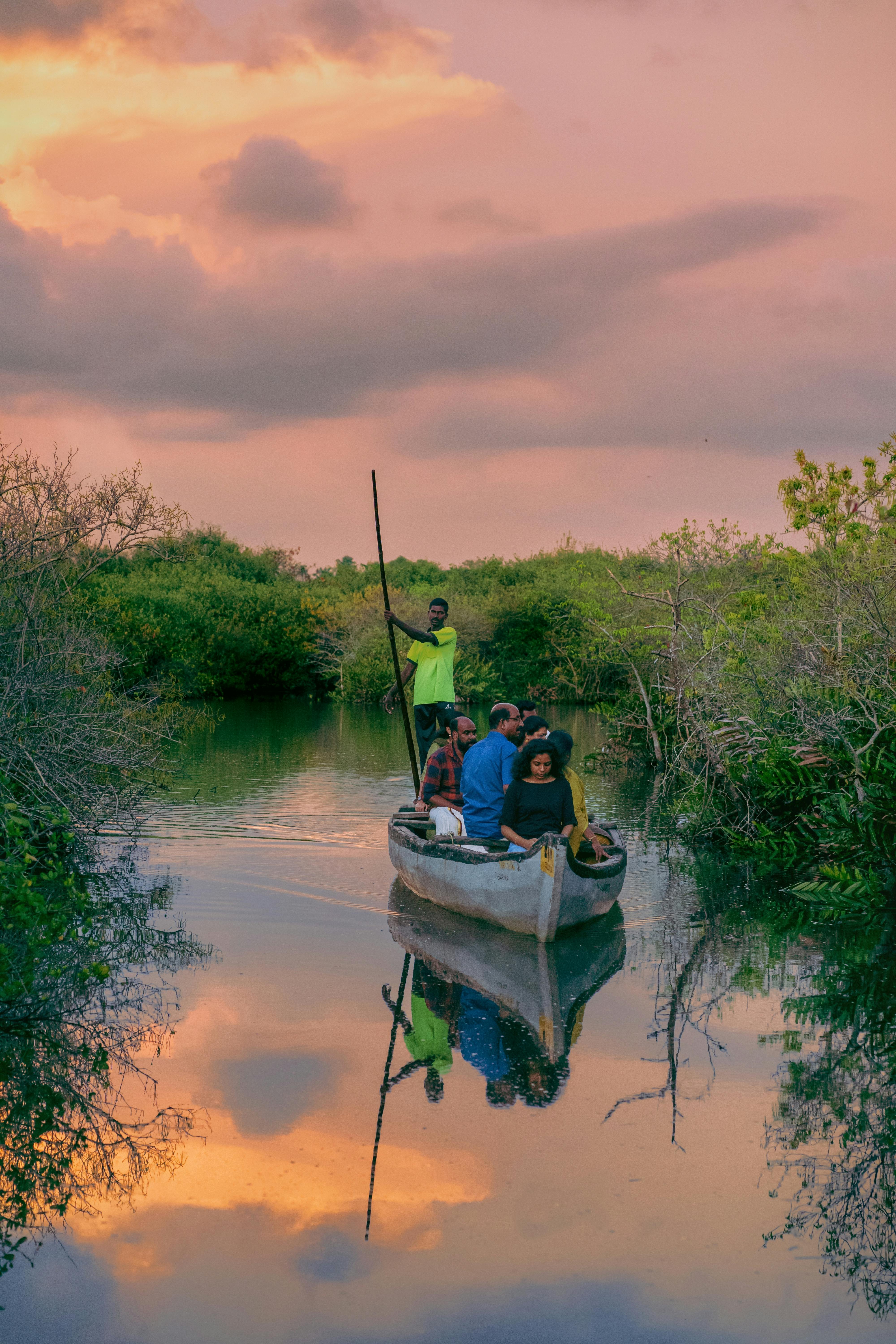 People Riding Boat on the River · Free Stock Photo