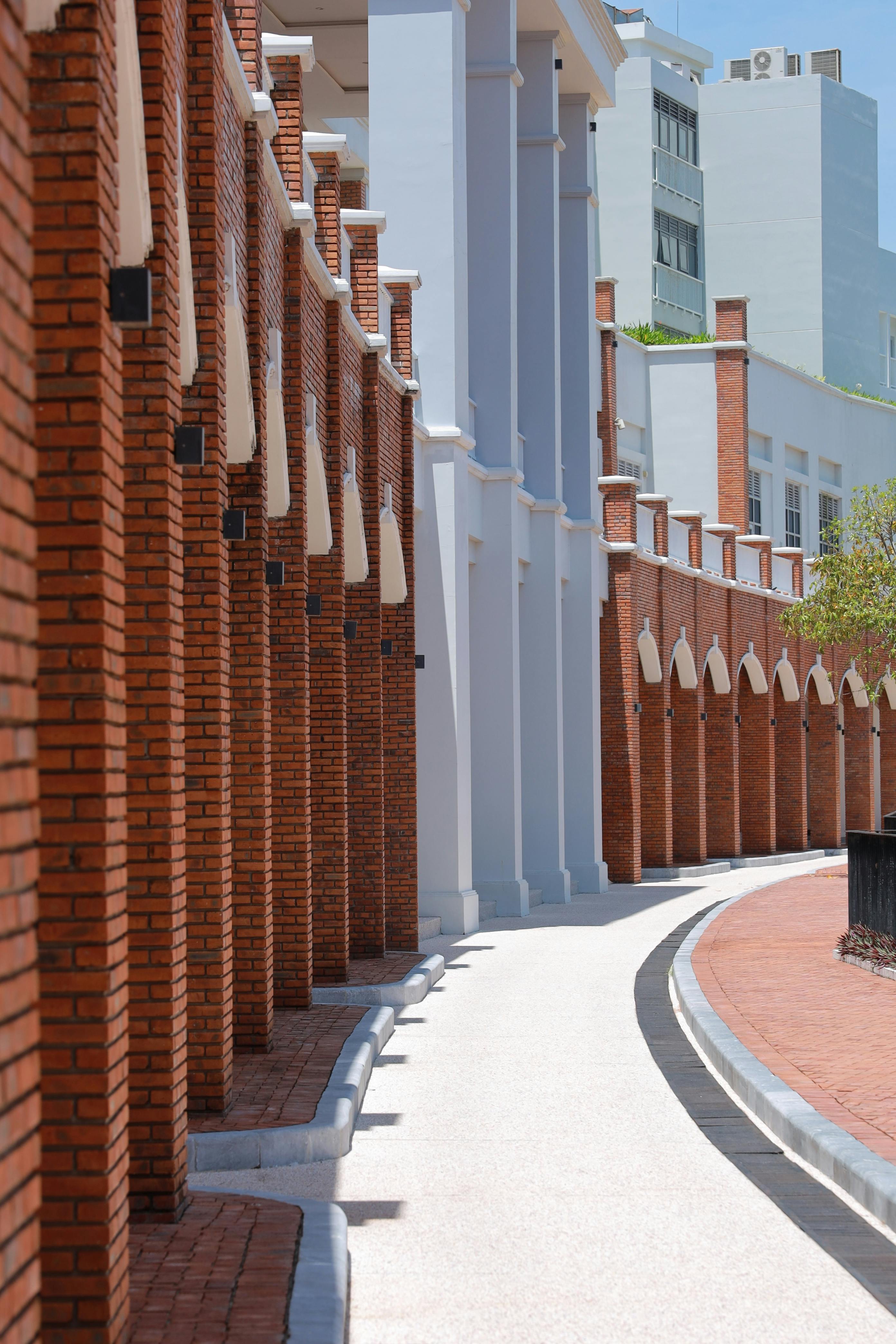 Facade and Arcade of a Modern Building in City · Free Stock Photo