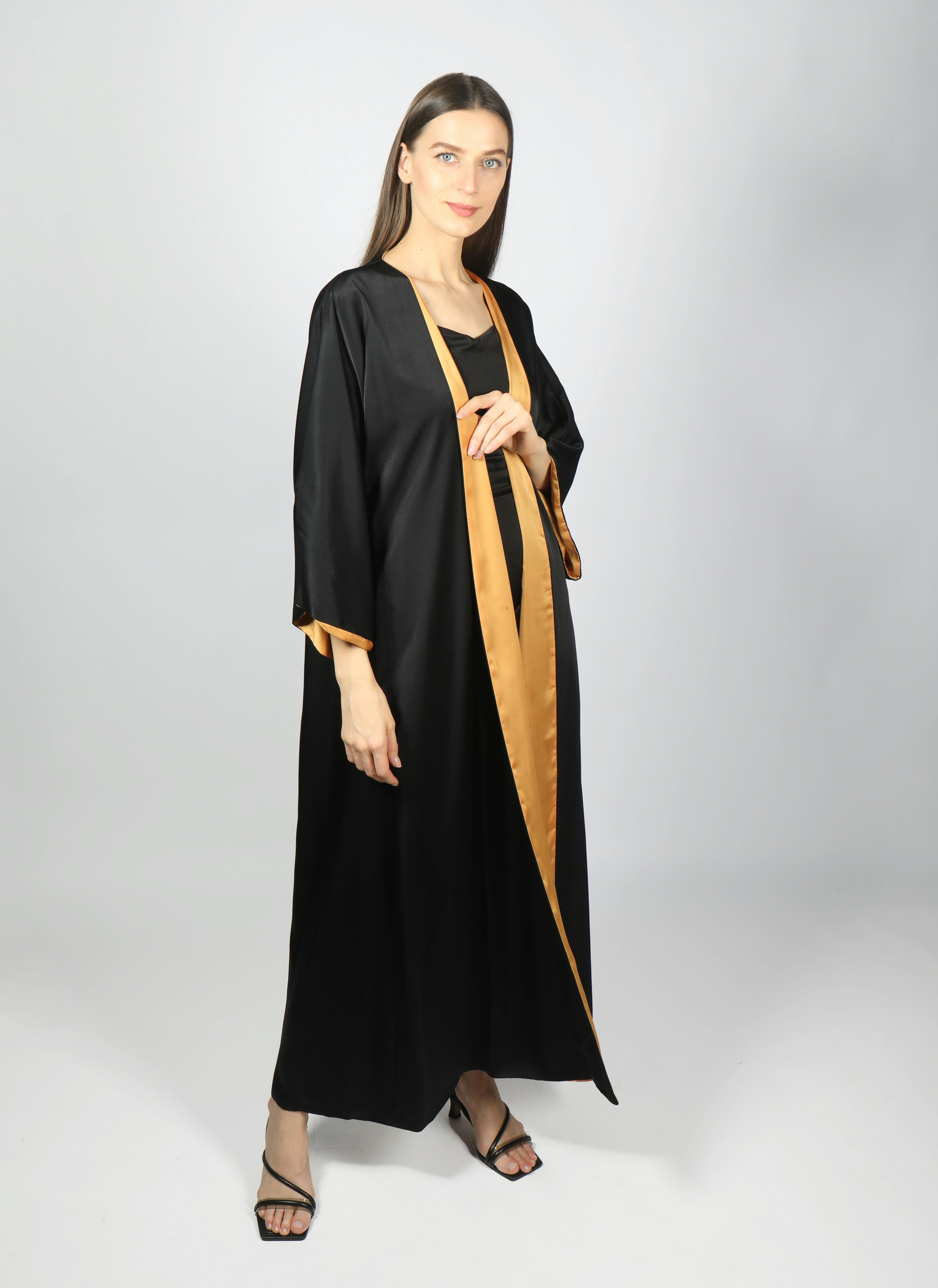 Woman Wearing Black Robe on White Back · Free Stock Photo