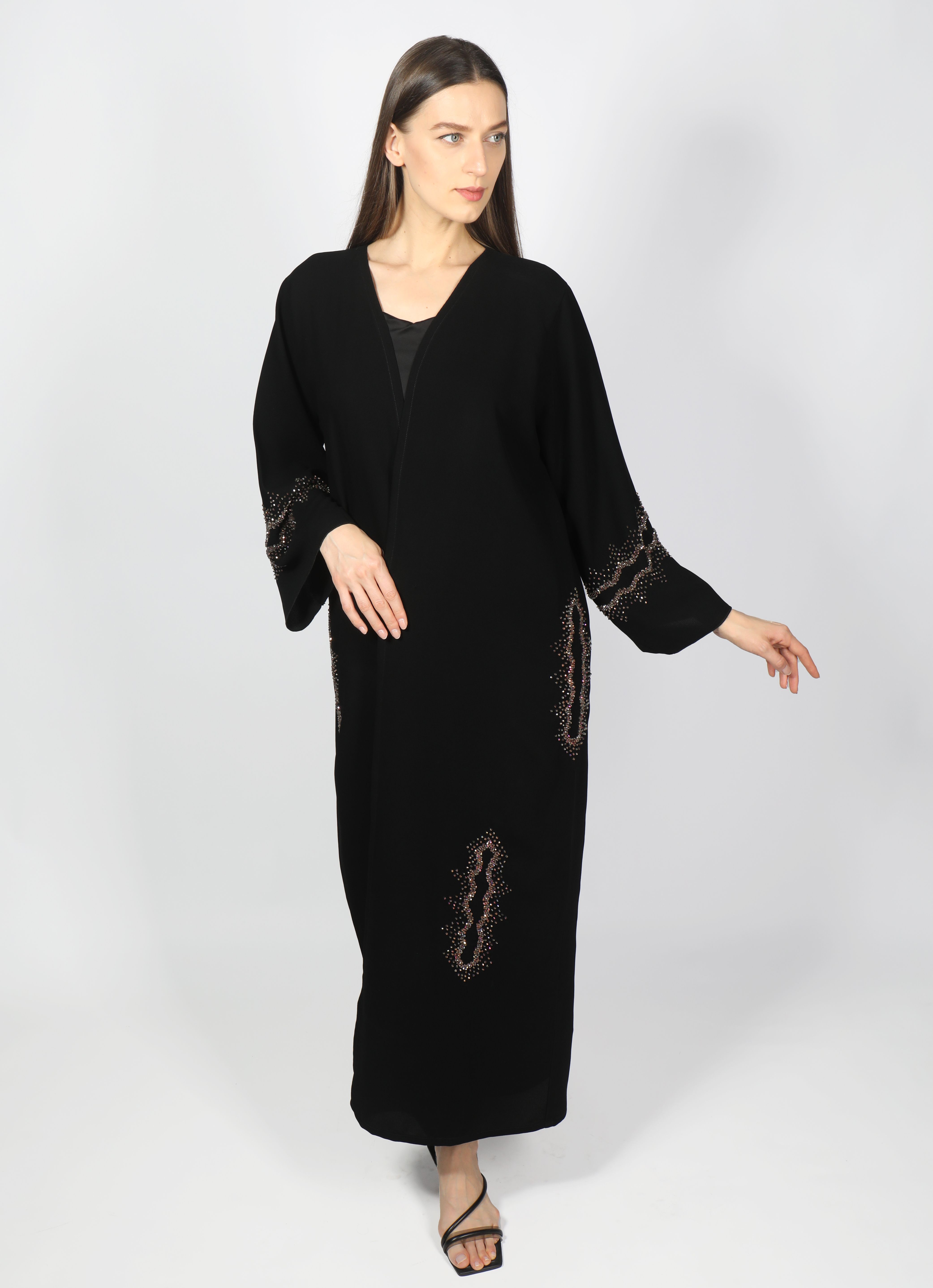 Woman Wearing a Floral Abaya · Free Stock Photo