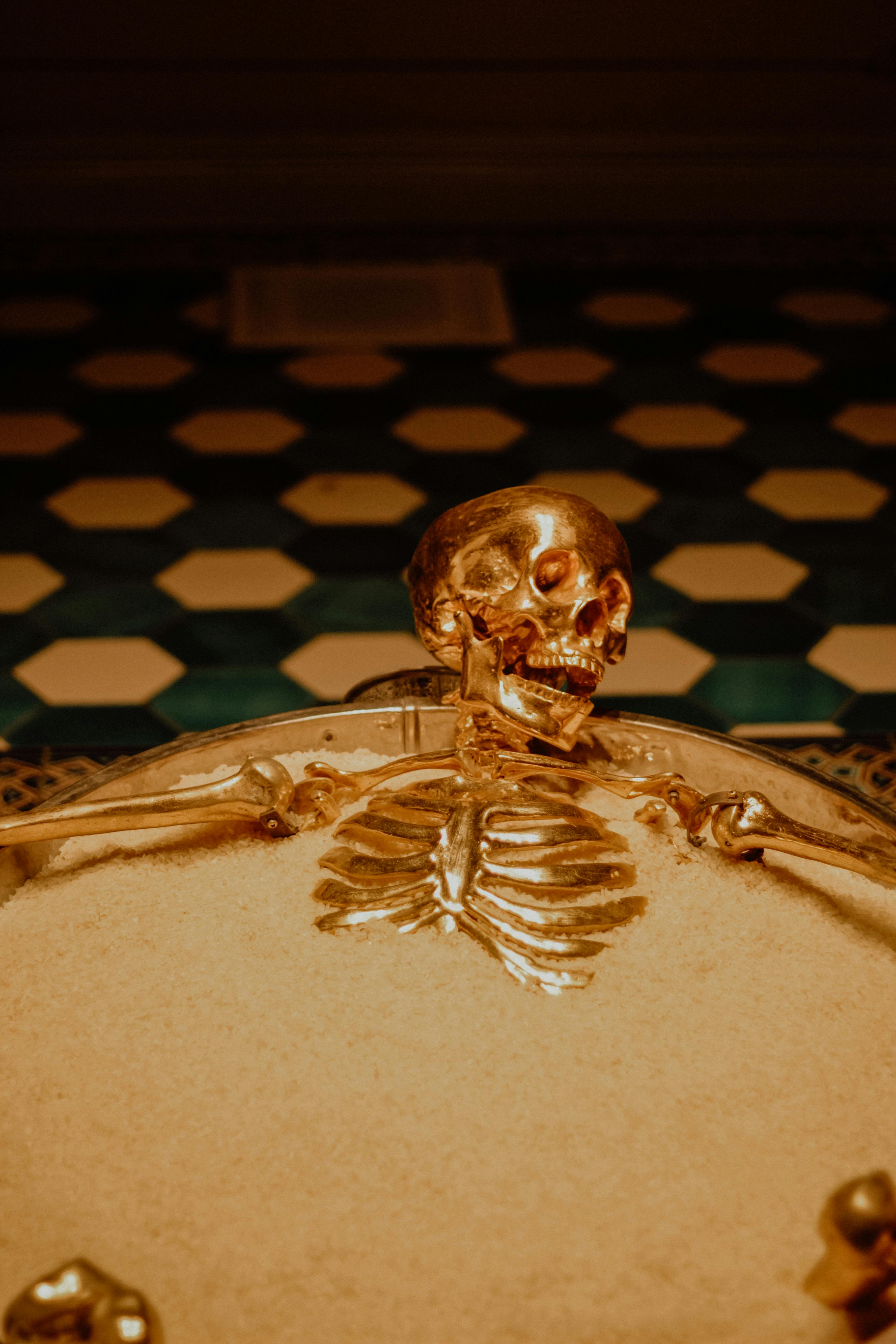 Gold Sugar-Bowl with Skeleton Figurine · Free Stock Photo