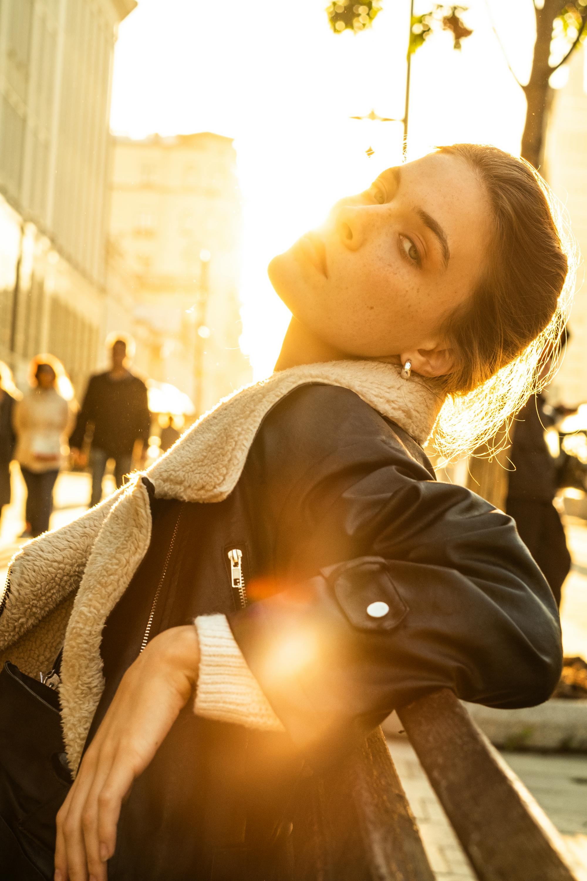 Brunette Posing with Autumn Leaf · Free Stock Photo