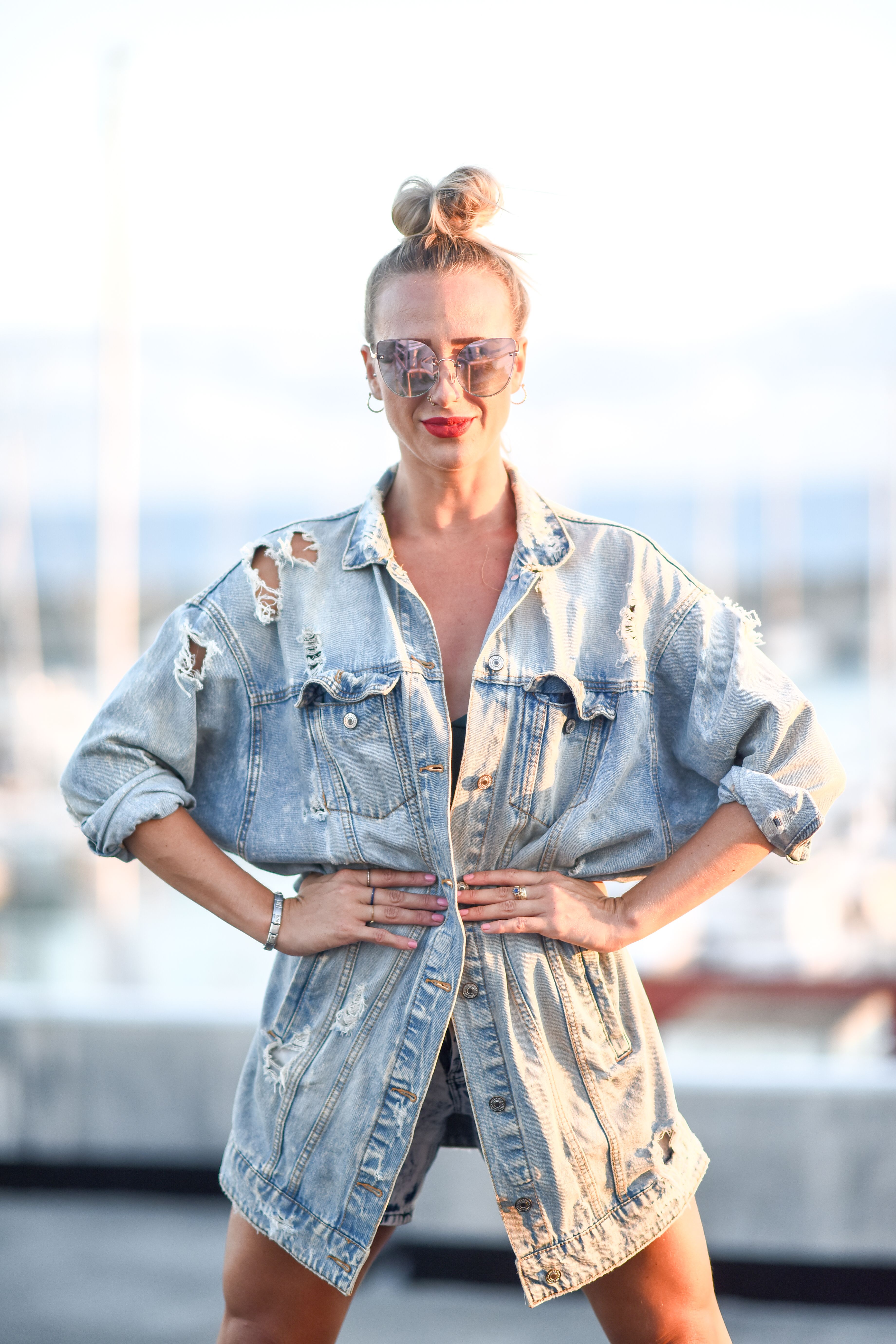 Muscular Woman in a Denim Jacket · Free Stock Photo