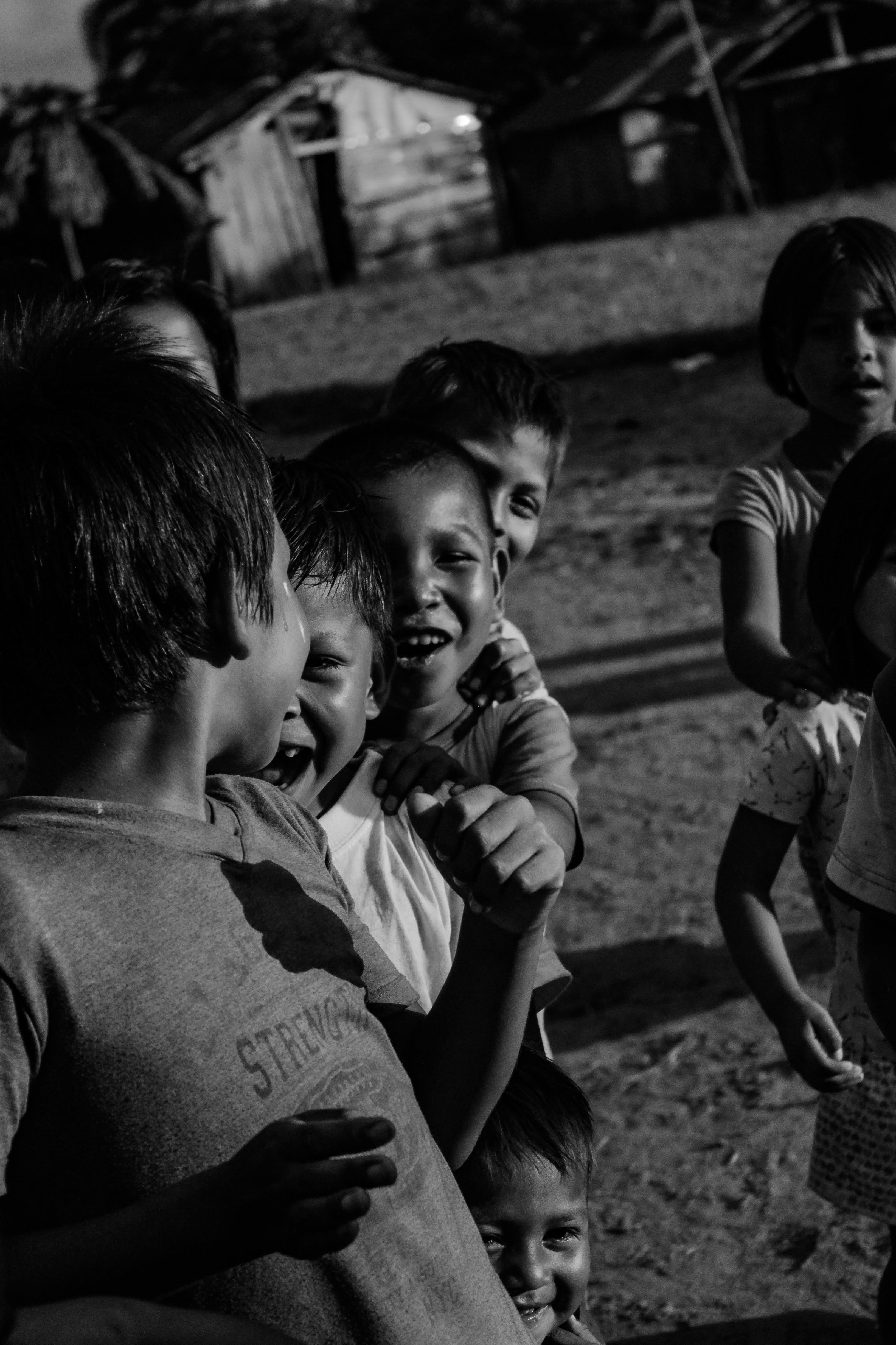 Grayscale Photo of Happy Children · Free Stock Photo