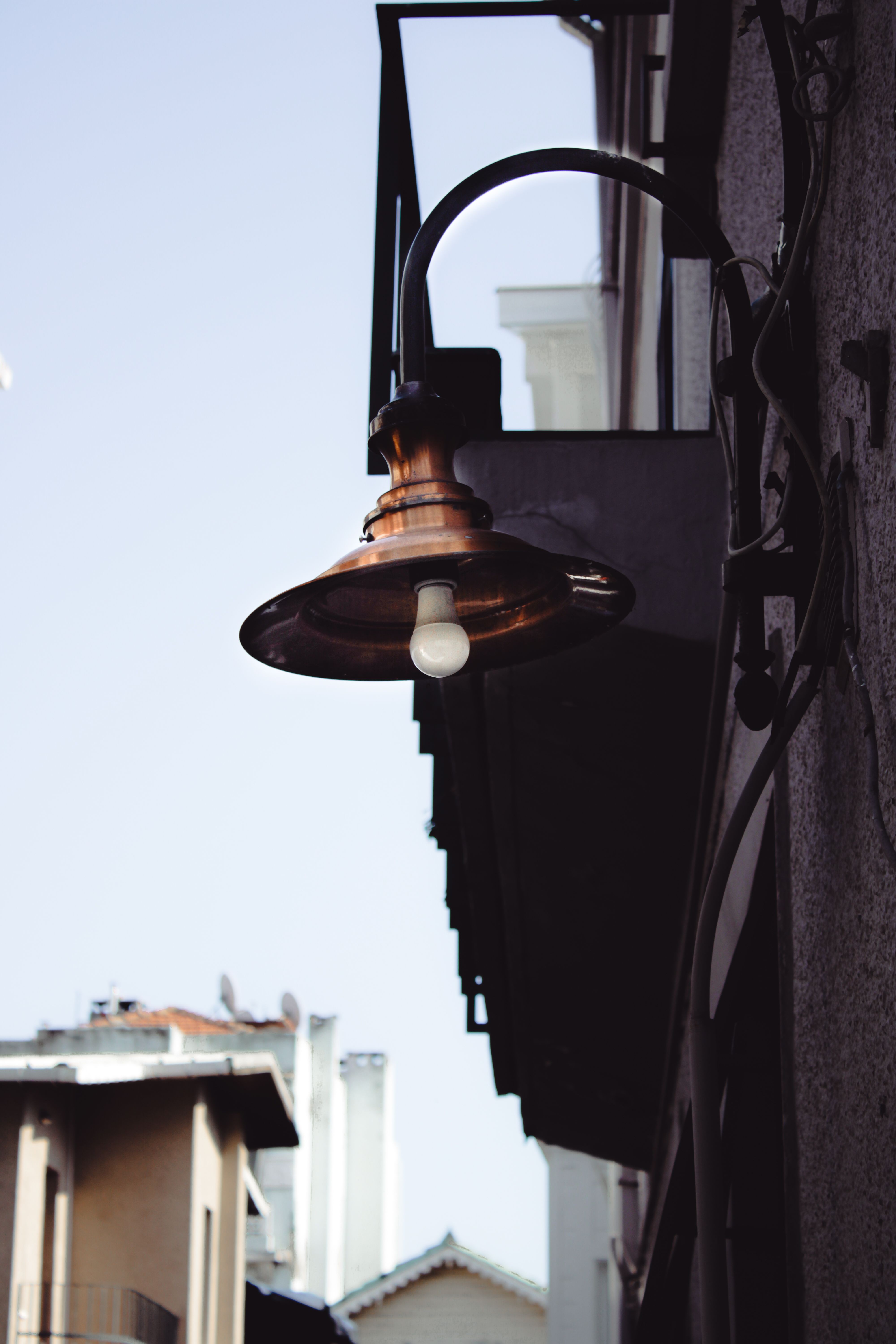 Vintage Lantern on Building Facade · Free Stock Photo