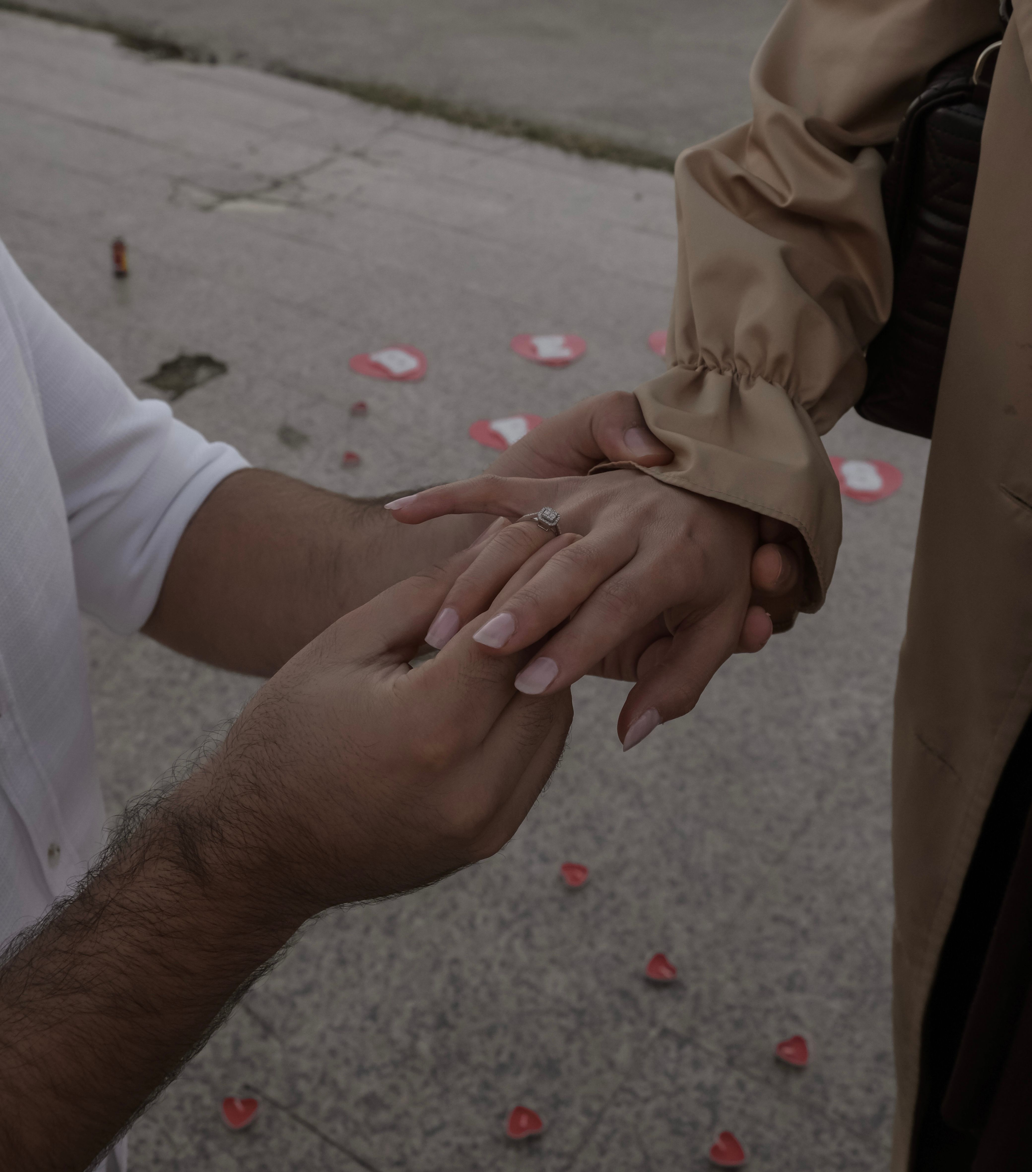 A Couple Holding Each Others Hand · Free Stock Photo