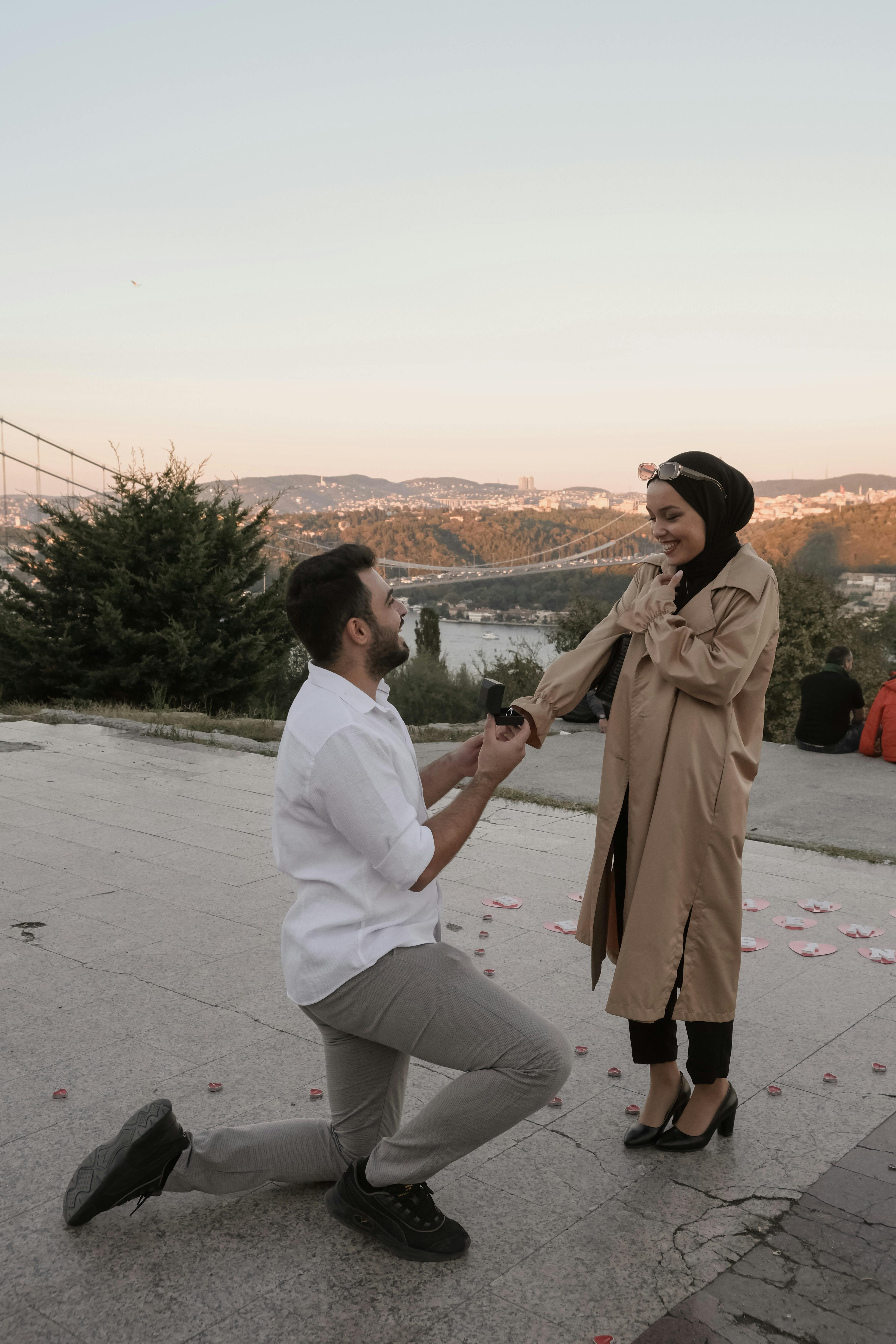Man Proposing to a Woman in Mountains · Free Stock Photo