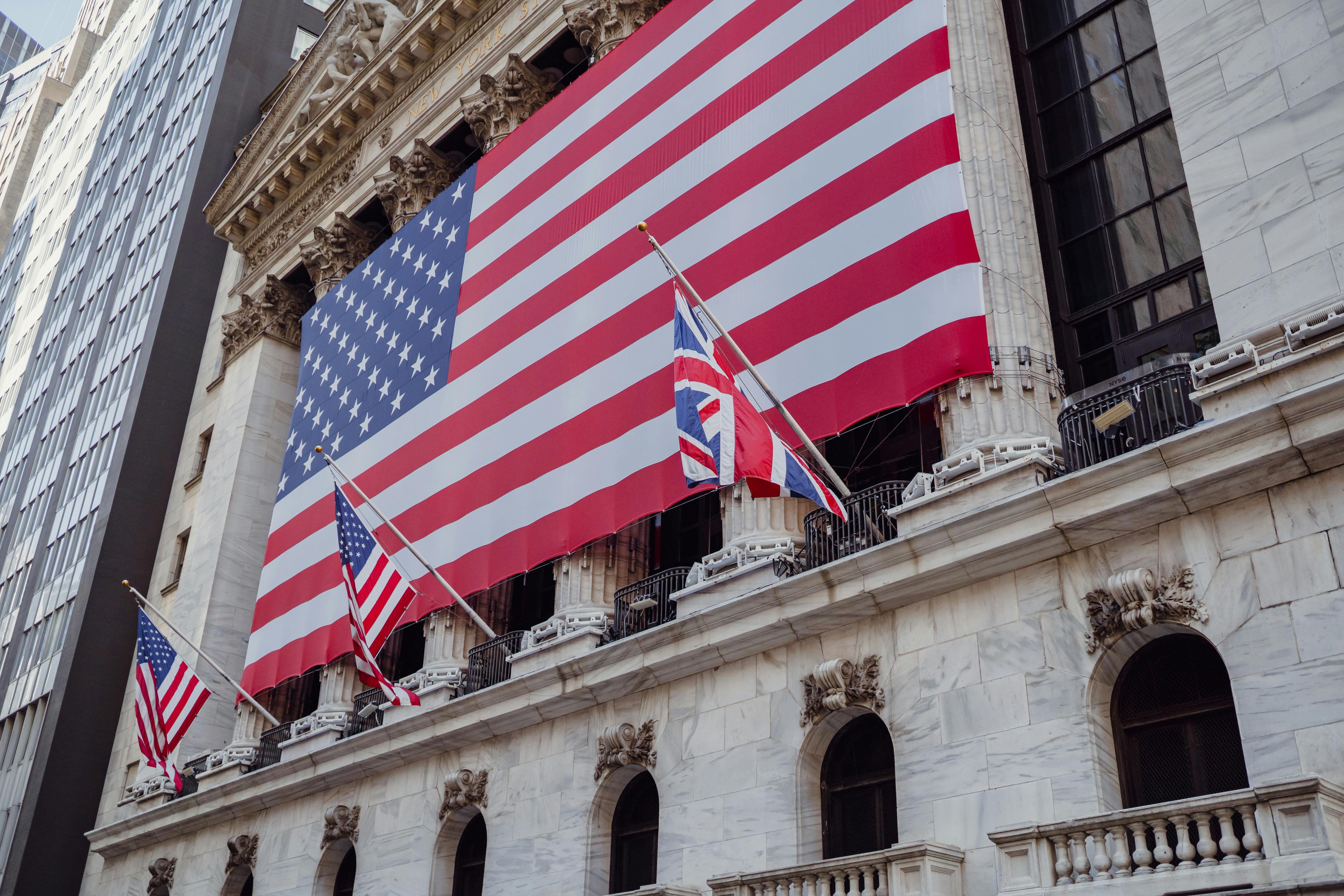 Low Angle View of American Flag on a Building · Free Stock Photo