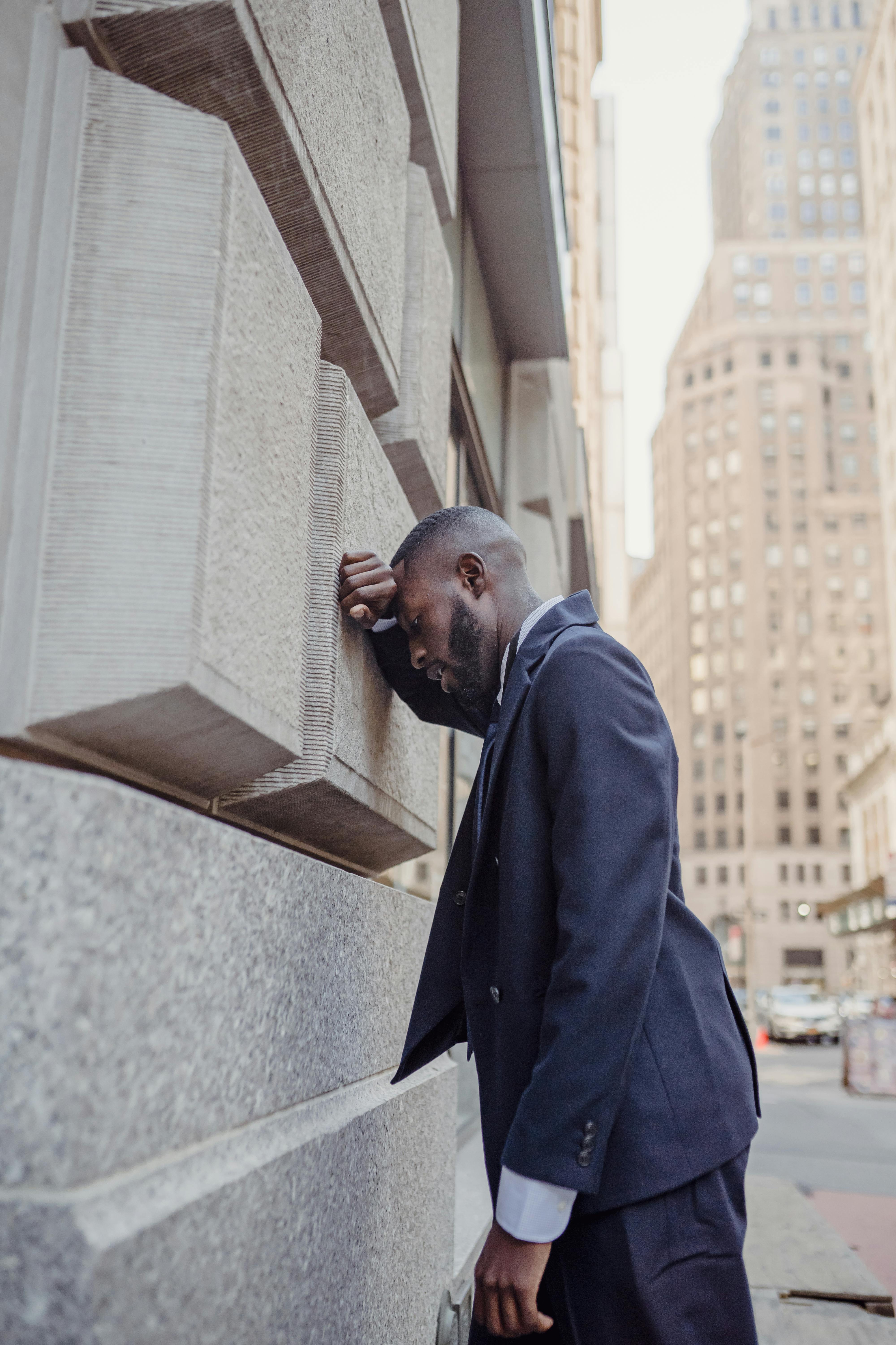 Sad Man with Face in Hands · Free Stock Photo