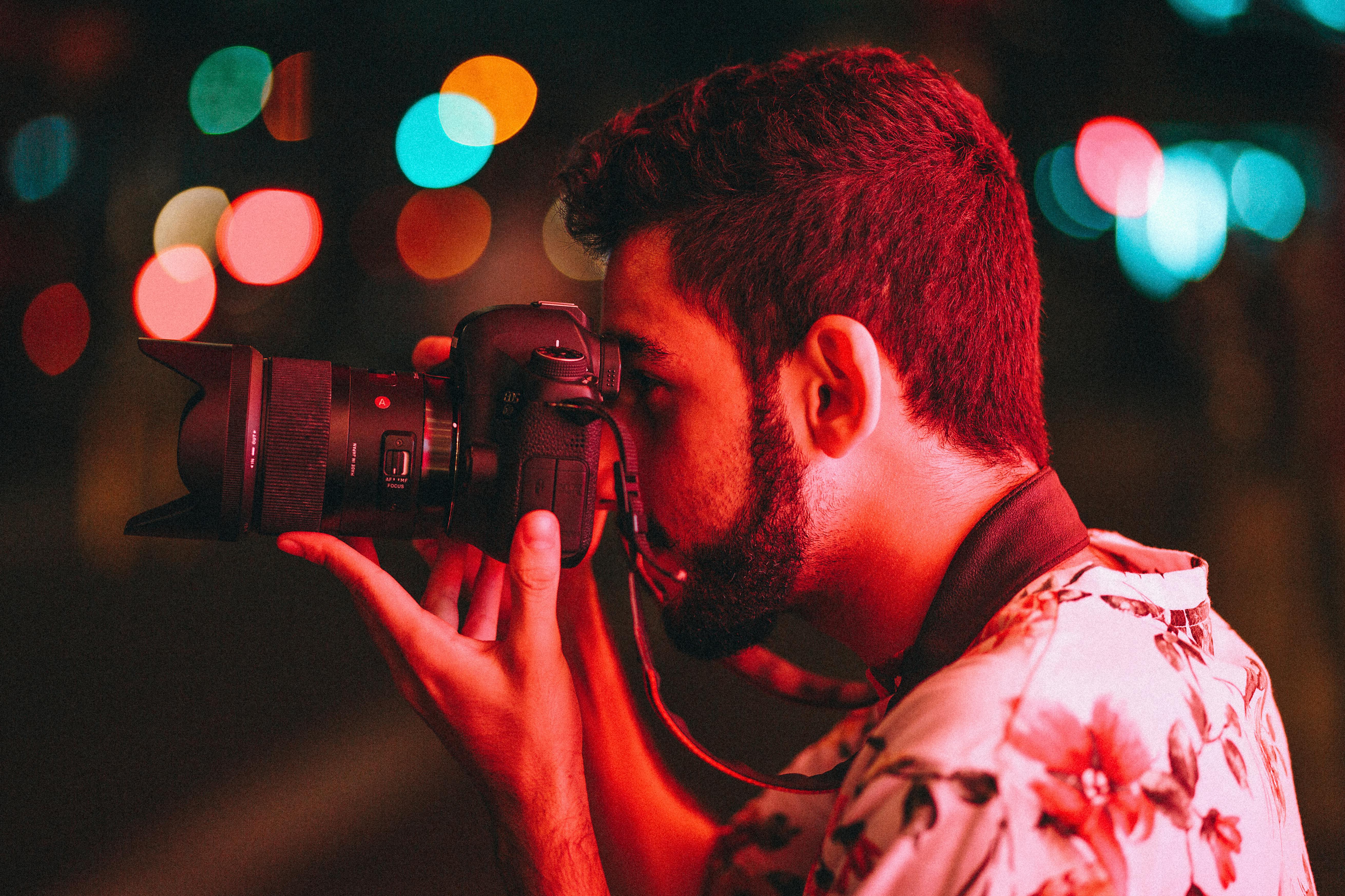 Man Holding Dslr Camera · Free Stock Photo