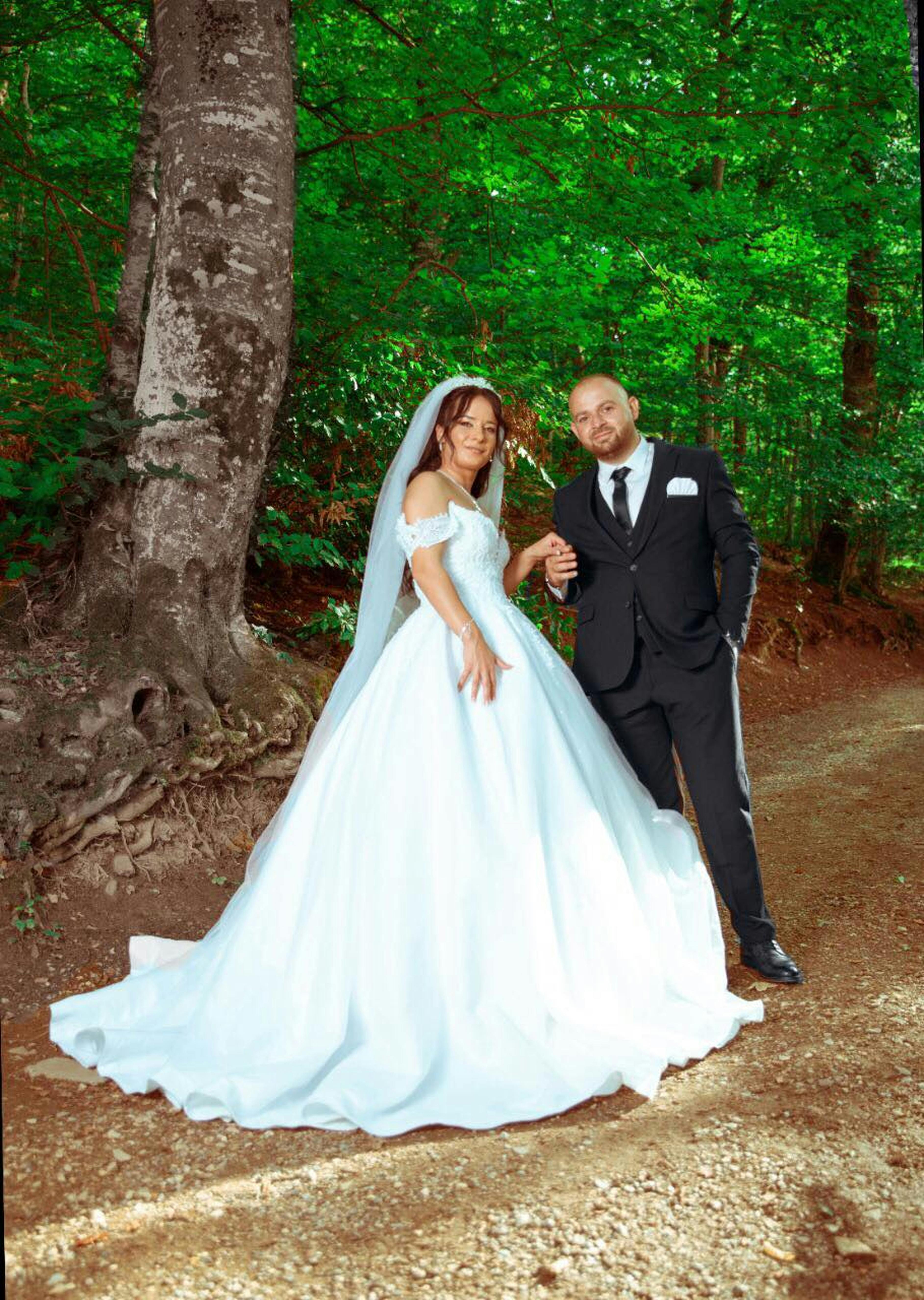 The Bride and Groom Holding Hands · Free Stock Photo