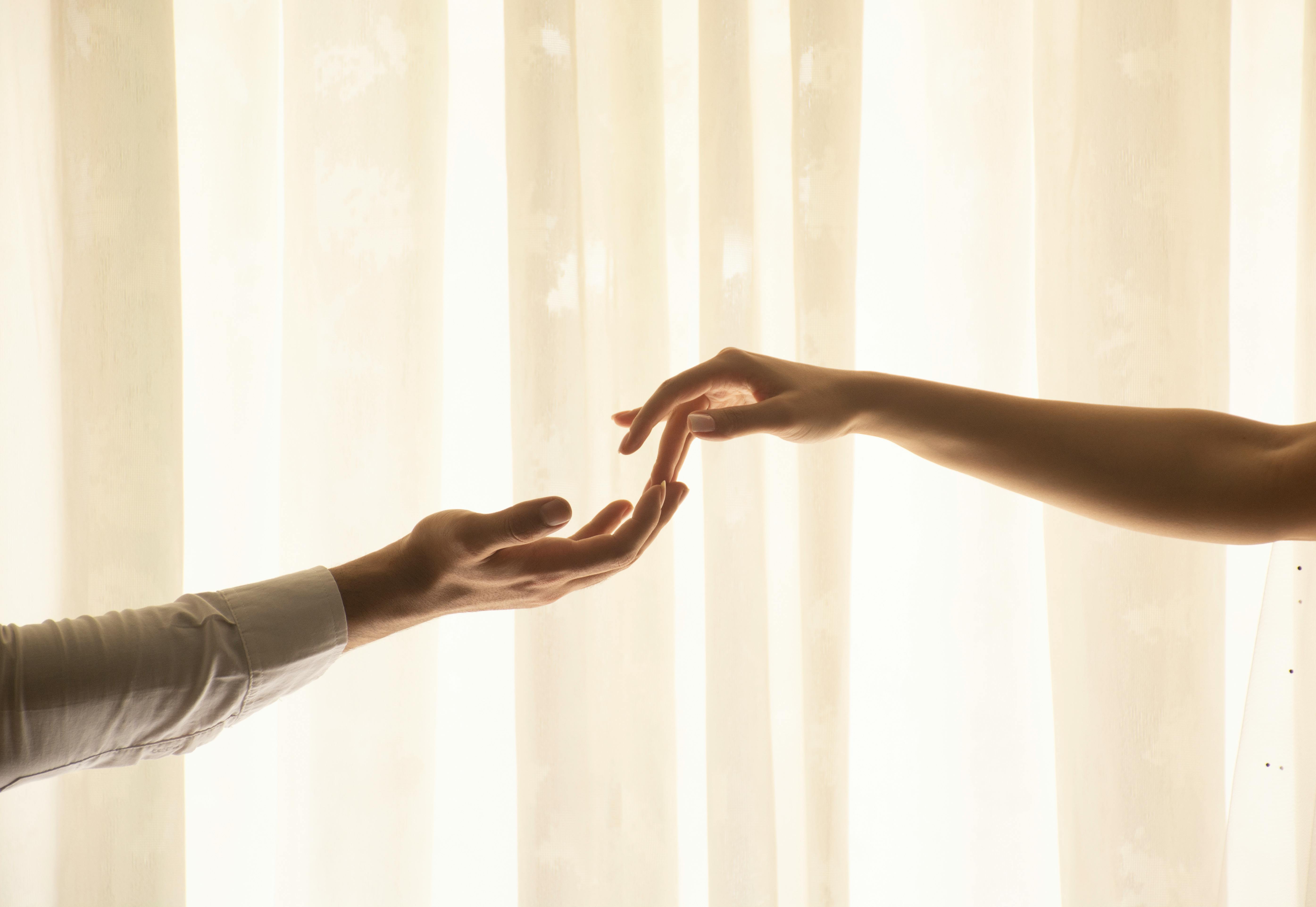 A Couple Touching Hands · Free Stock Photo