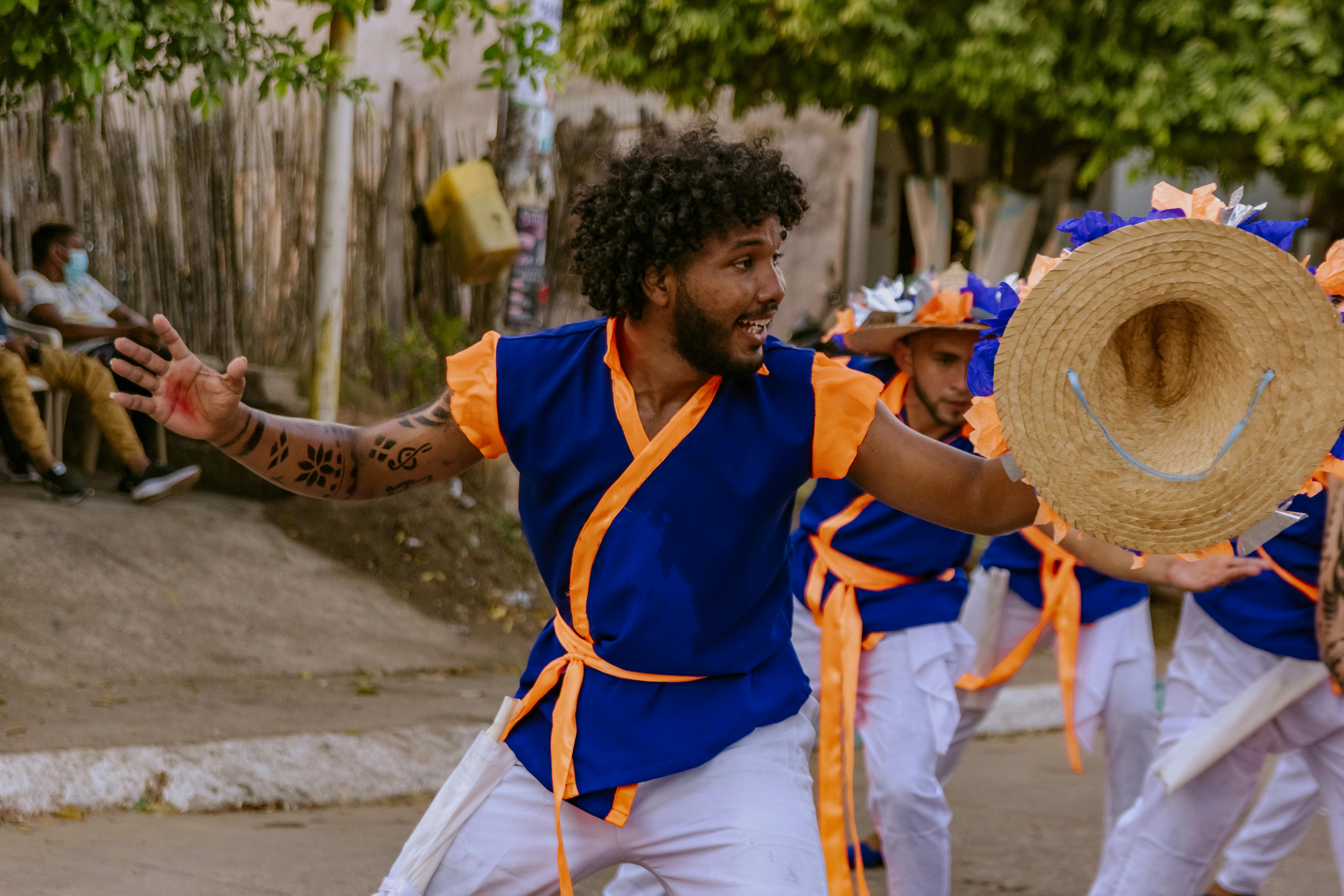 Man Dancing in a Costume for a Festival · Free Stock Photo