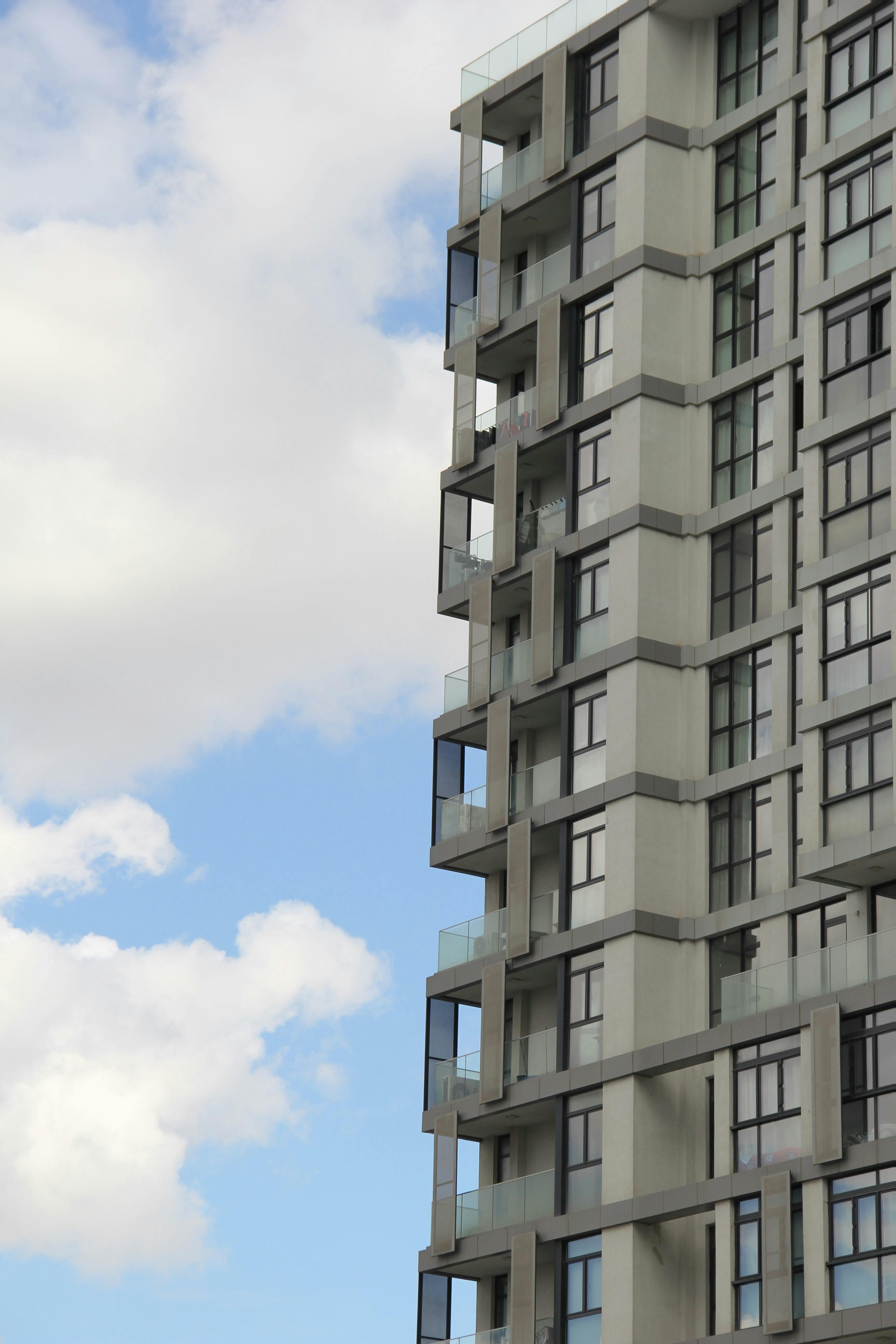 White Glass Window Concrete Separated High Rise Building · Free Stock Photo