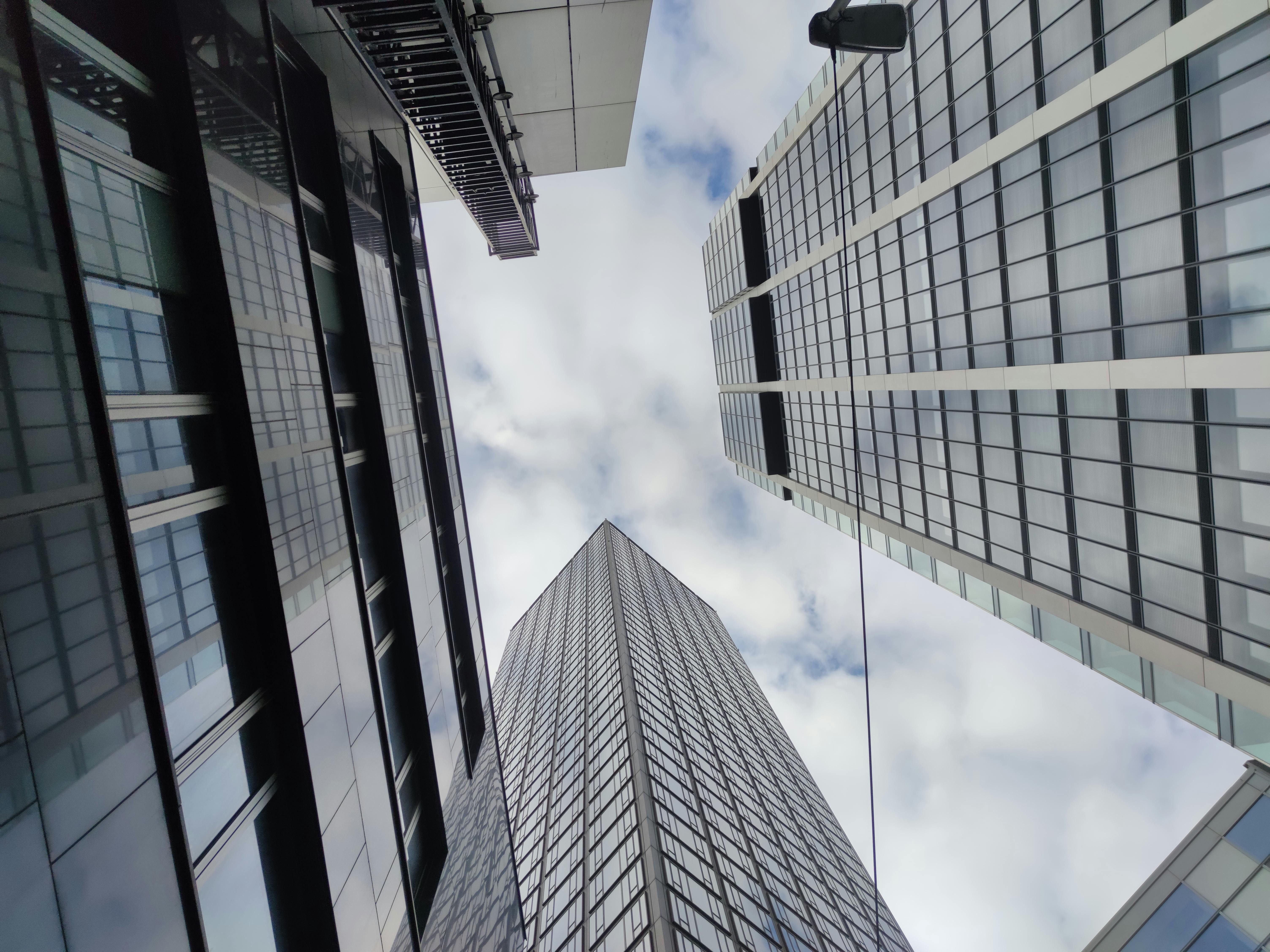 Cloudy Sky over Skyscrapers · Free Stock Photo
